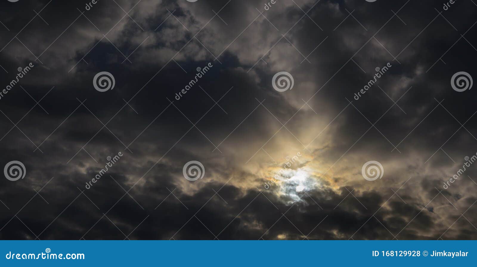 Dark Clouds of Doom with Sun in Background Stock Photo - Image of ...