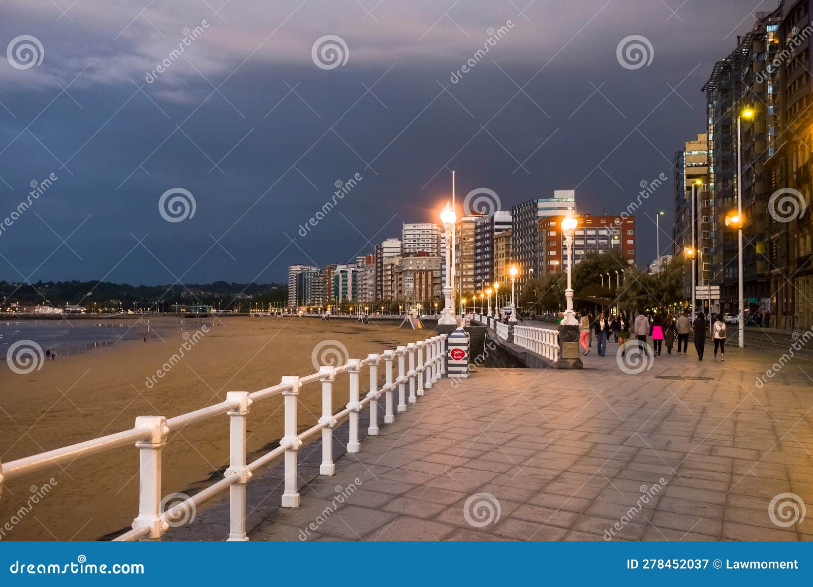 Dark Clouds in the Evening Over the Promenade Area in Gijon, Spain ... Dark Clouds in the Evening Over the Promenade Area in Gijon, Spain ...