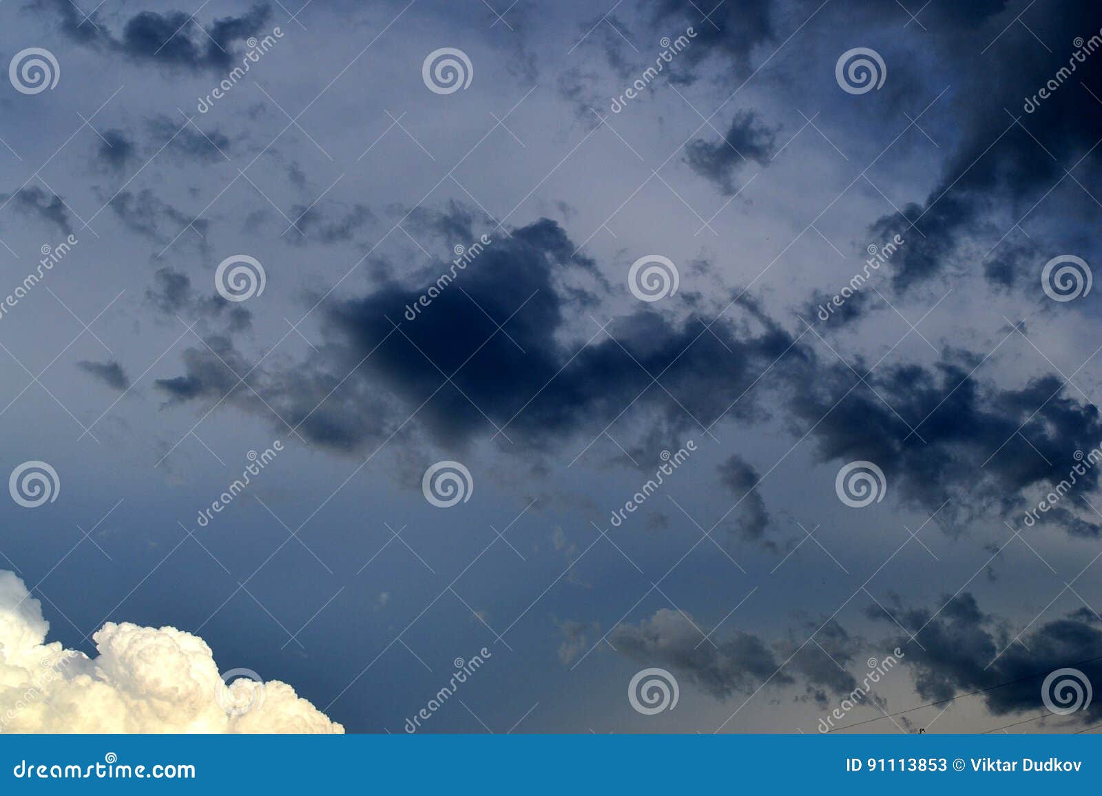 Dark Clouds Float through the Blue Sky Stock Image - Image of unusual ...