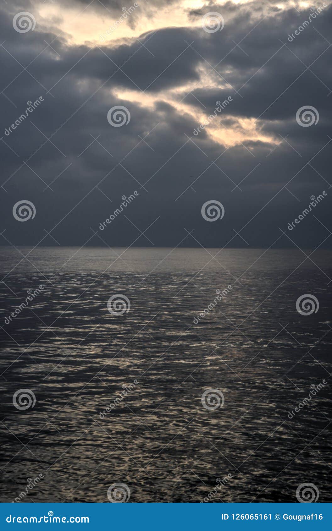 Dark clouds on the sea. stock image. Image of ocean - 126065161