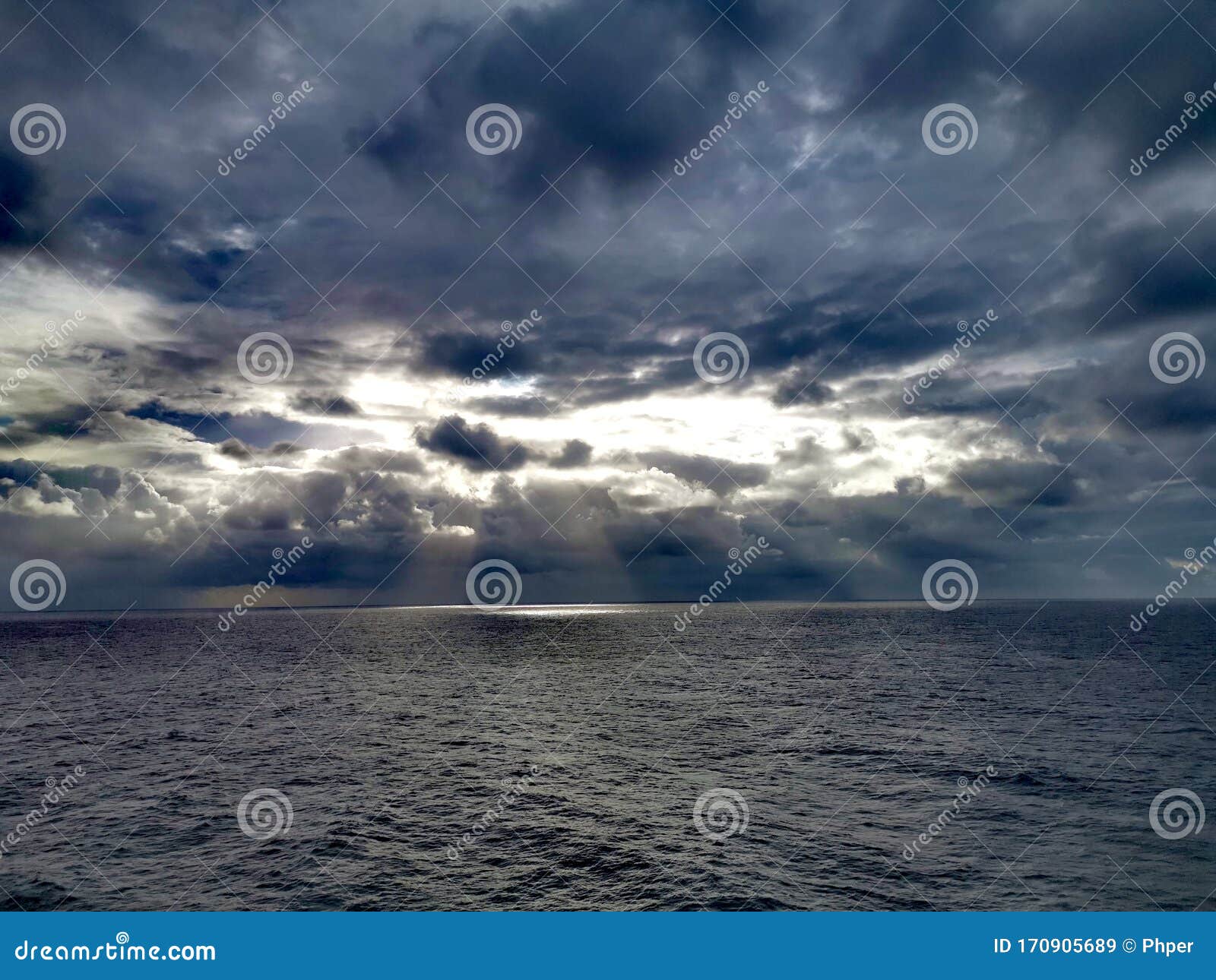 Dark clouds and Ocean view stock image. Image of ocean - 170905689