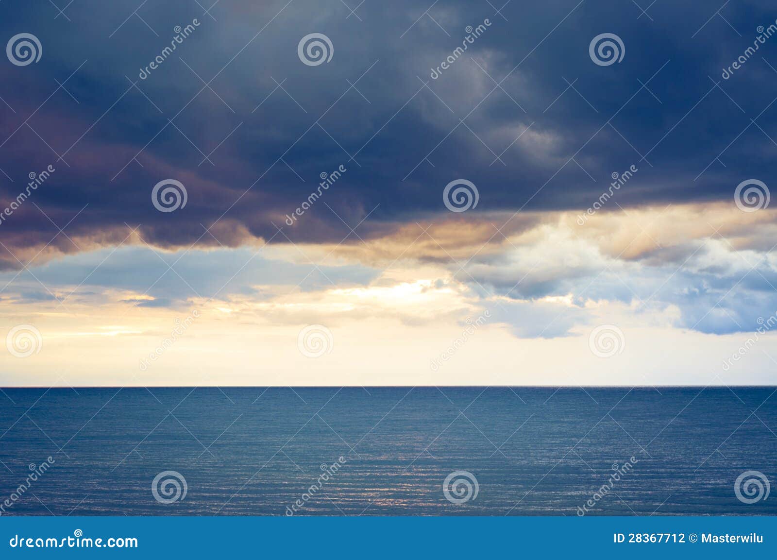 Dark clouds over the sea stock photo. Image of environment - 28367712