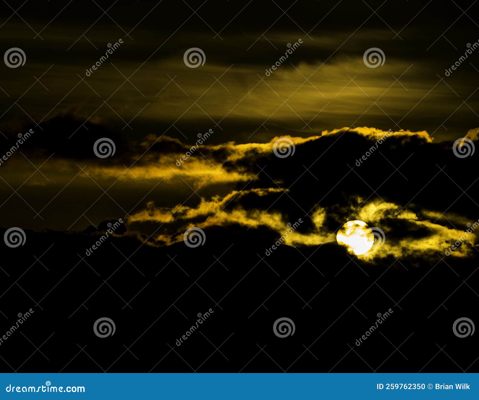 Dark Clouds with Setting Sun Stock Photo - Image of reflection ...