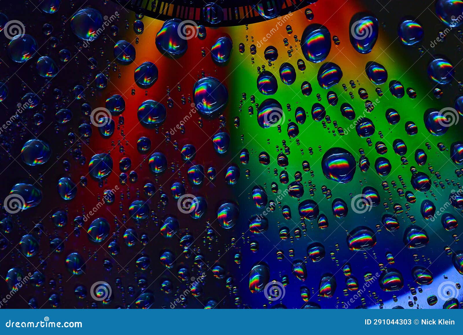 Dark and Colorful Metallic Surface with Rainbow Bubbles on Abstract CD ...