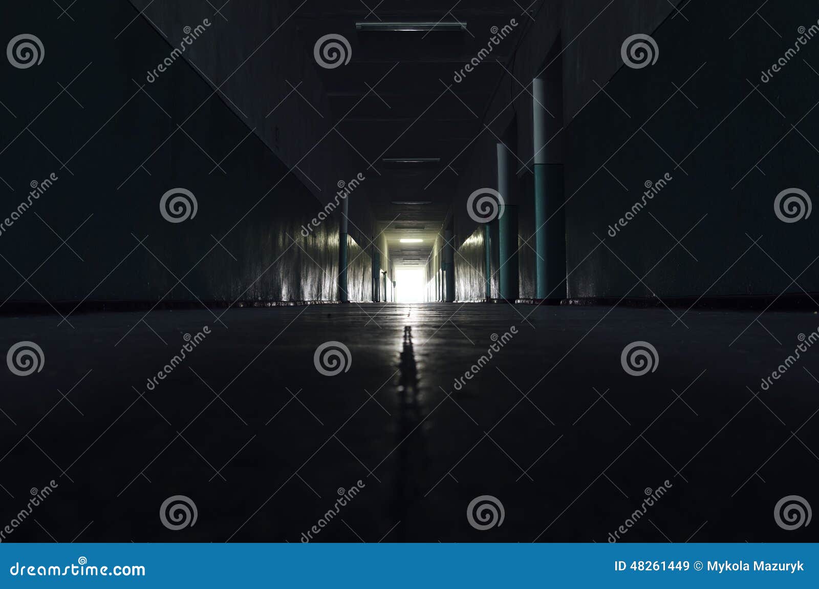Dark corridor with light stock image. Image of floor - 48261449