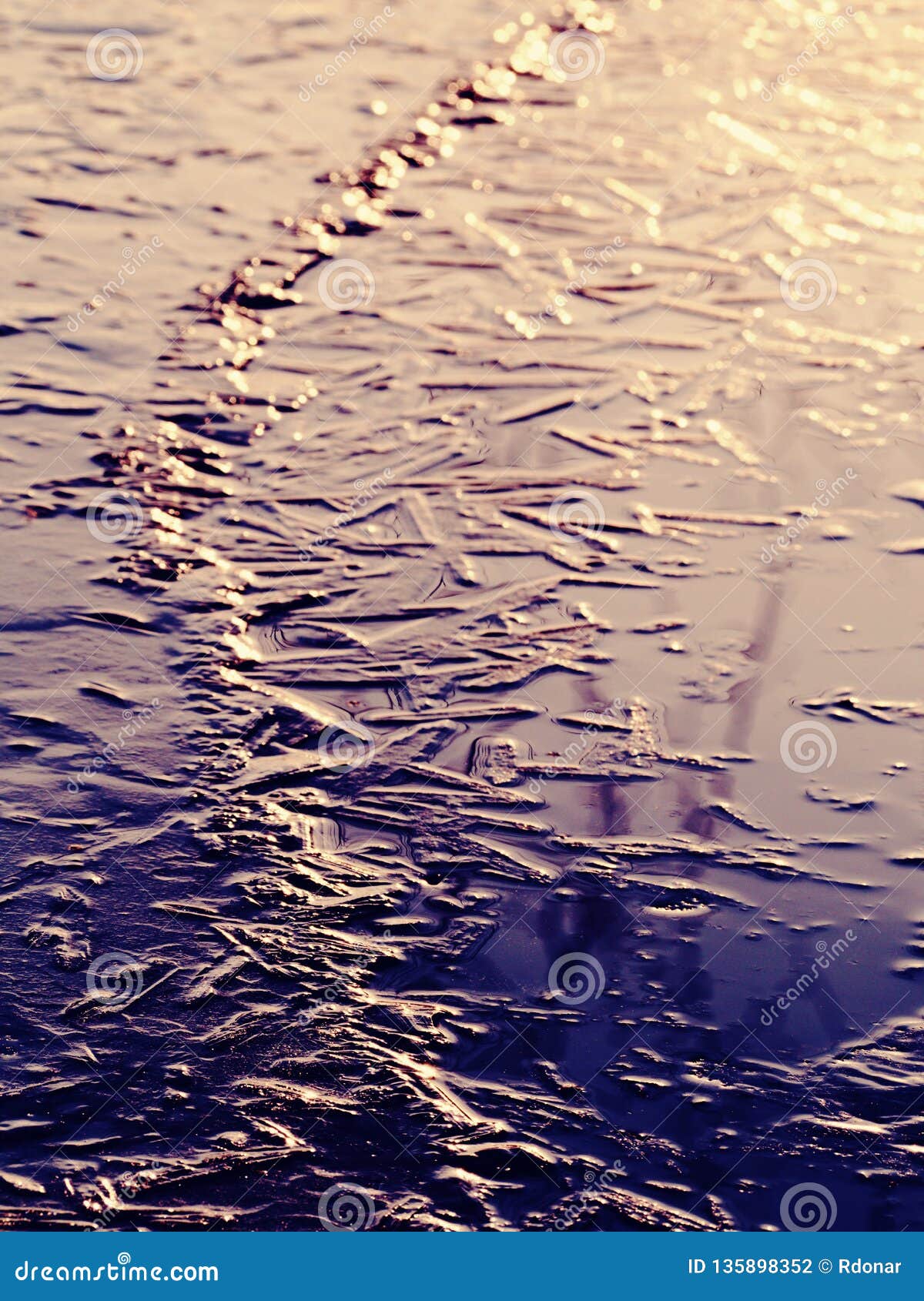 Dark Crust of Glistening Ice with Reflections Stock Photo - Image of ...