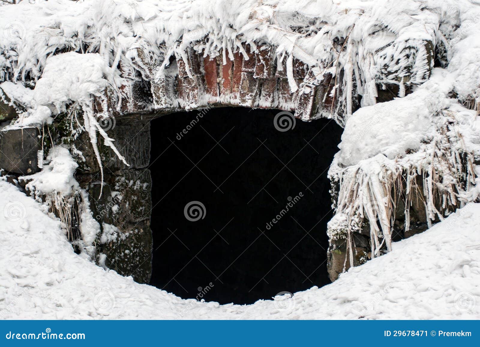 Dark Entrance To an Underground Cave Covered by Snow Stock Image ...