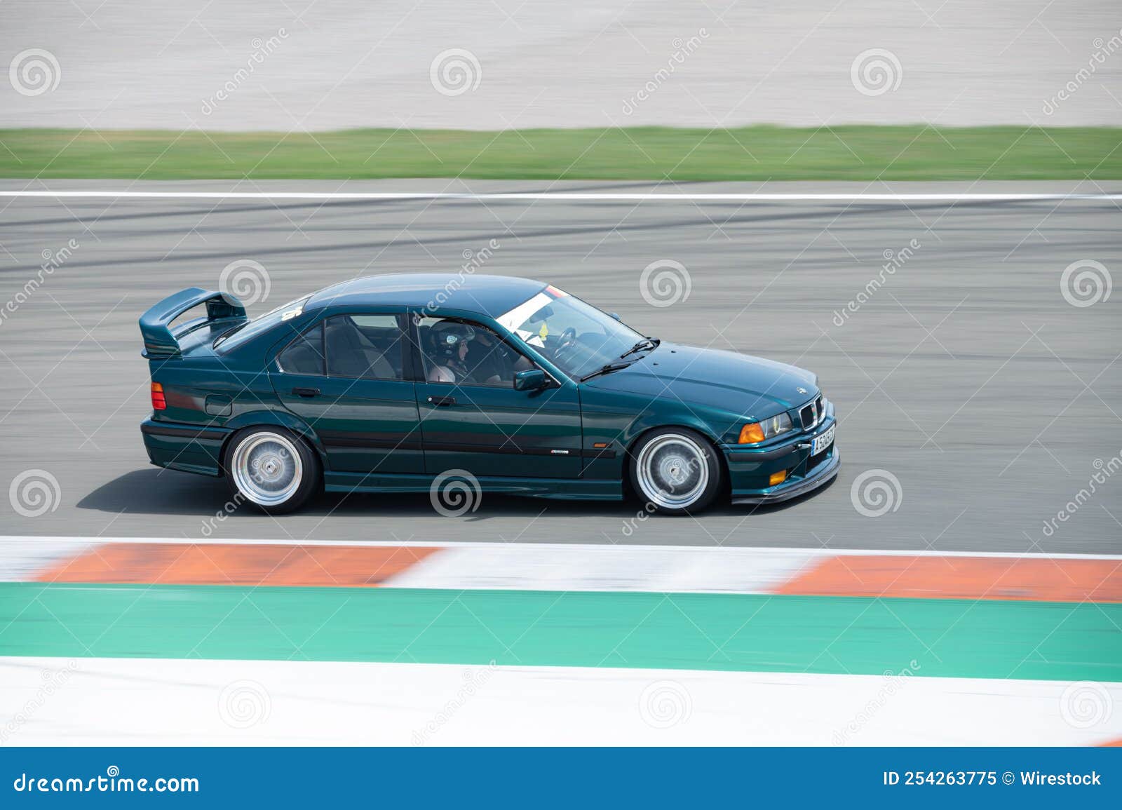 Dark Green BMW E36 Driving Fast on a Competition Track Editorial Image ...