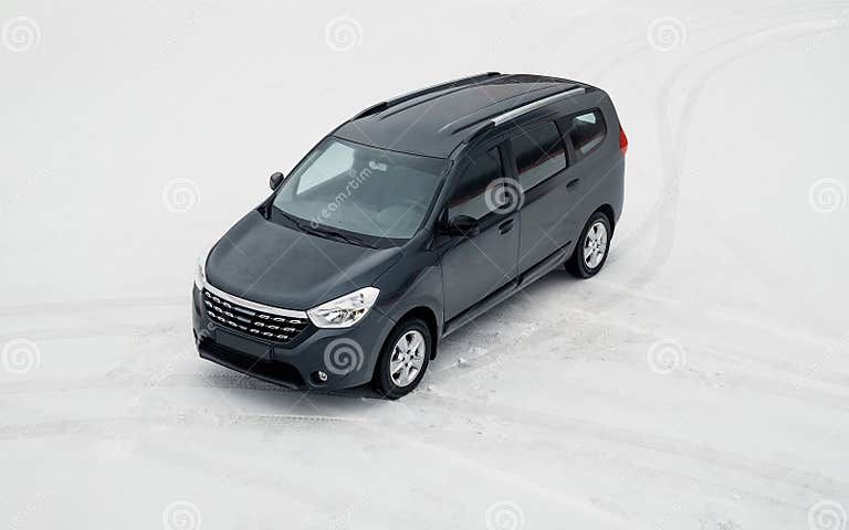 Dark grey minivan on snow. stock photo. Image of footprint - 354748668
