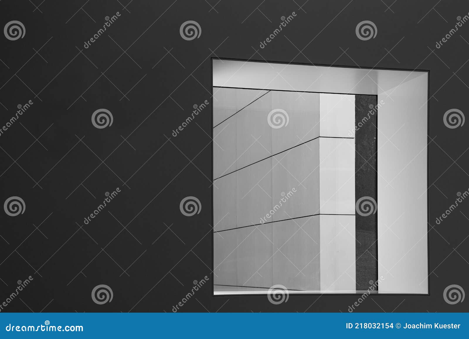 A Dark Grey Wall with a Window Leading To a White Wall with Diagonal ...