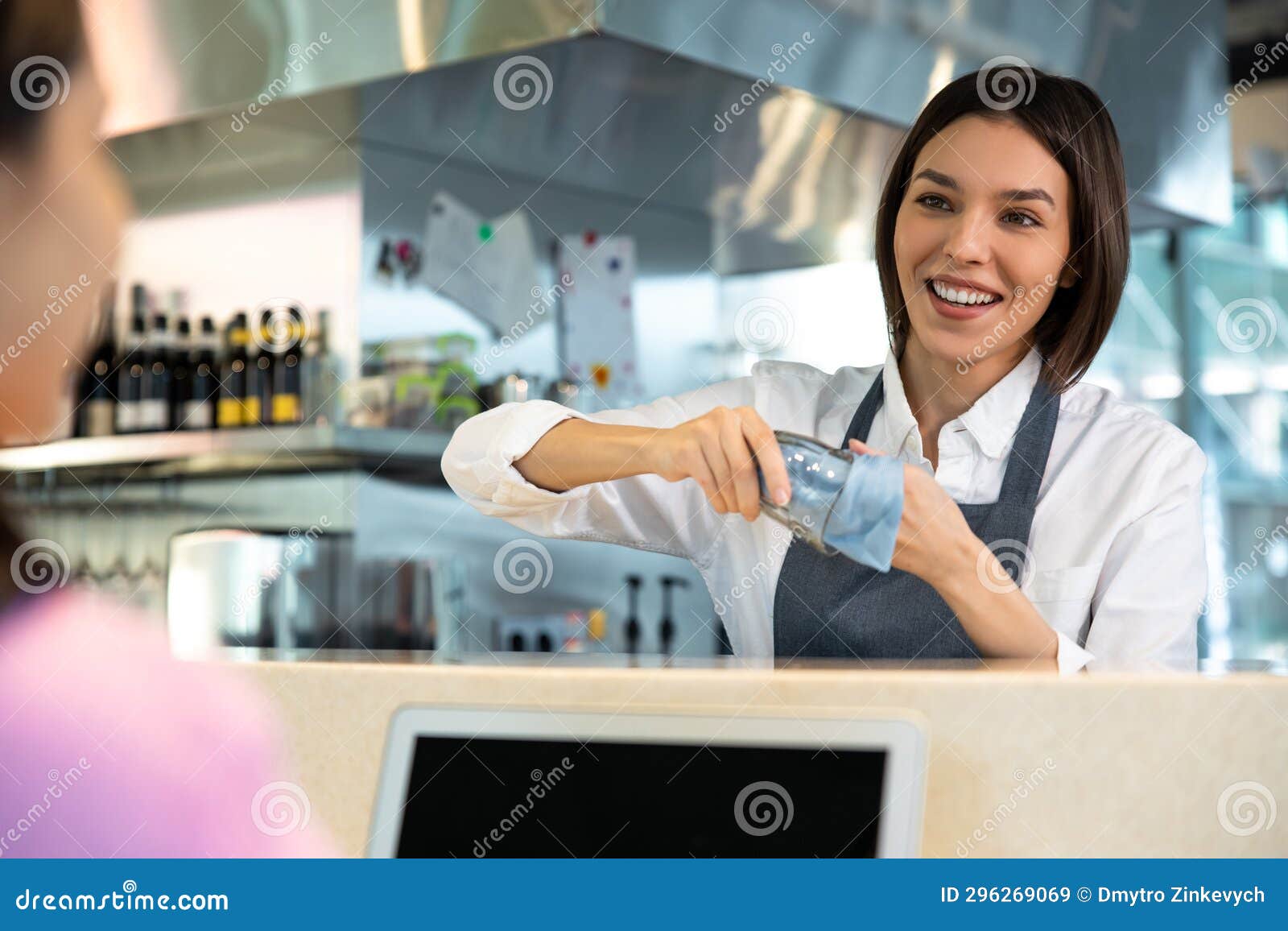 Dark-haired Coffee Shop Assistant Cleaning Glasses and Smiling Stock ...