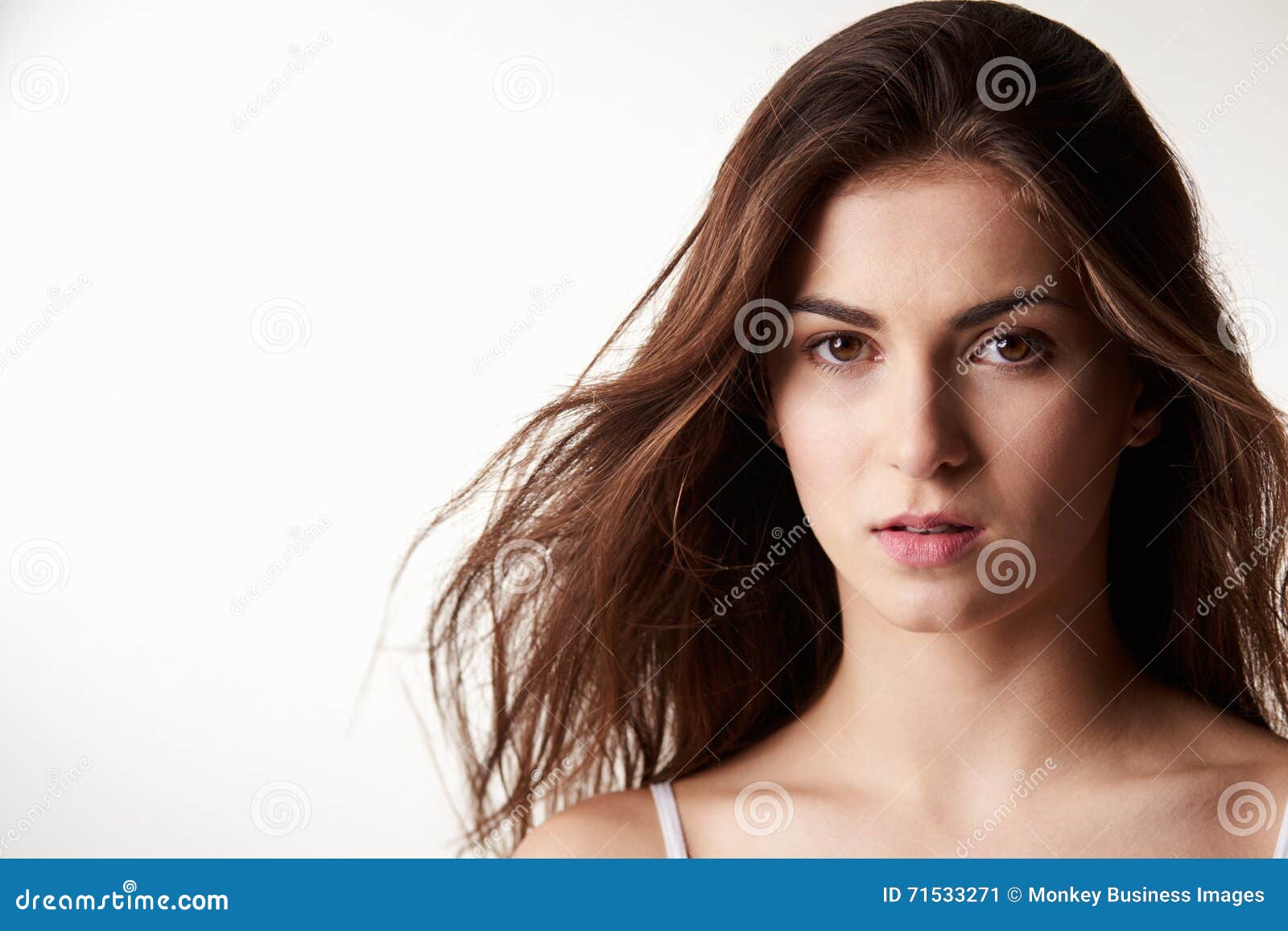 Dark Haired Girl in Late Teens with Serious Expression Stock Image ...