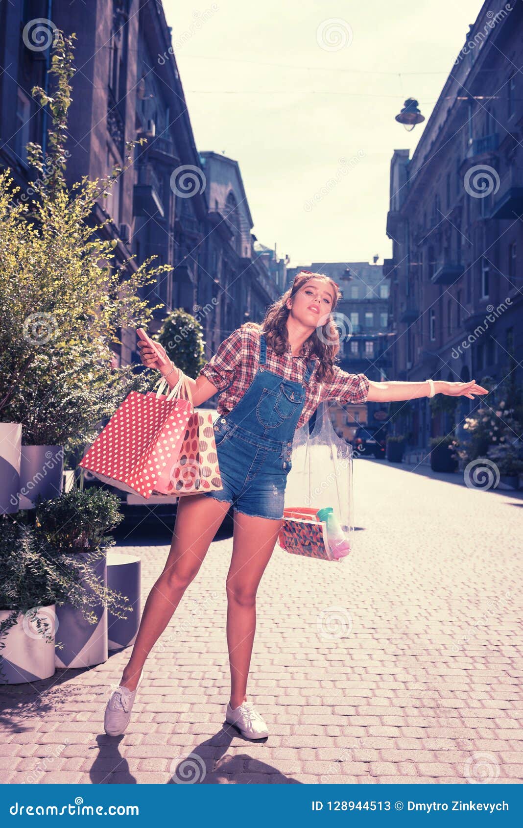 Dark Haired Shopping Addicted Woman Standing On The Road Waiting For Taxi Stock Image Image Of 7909