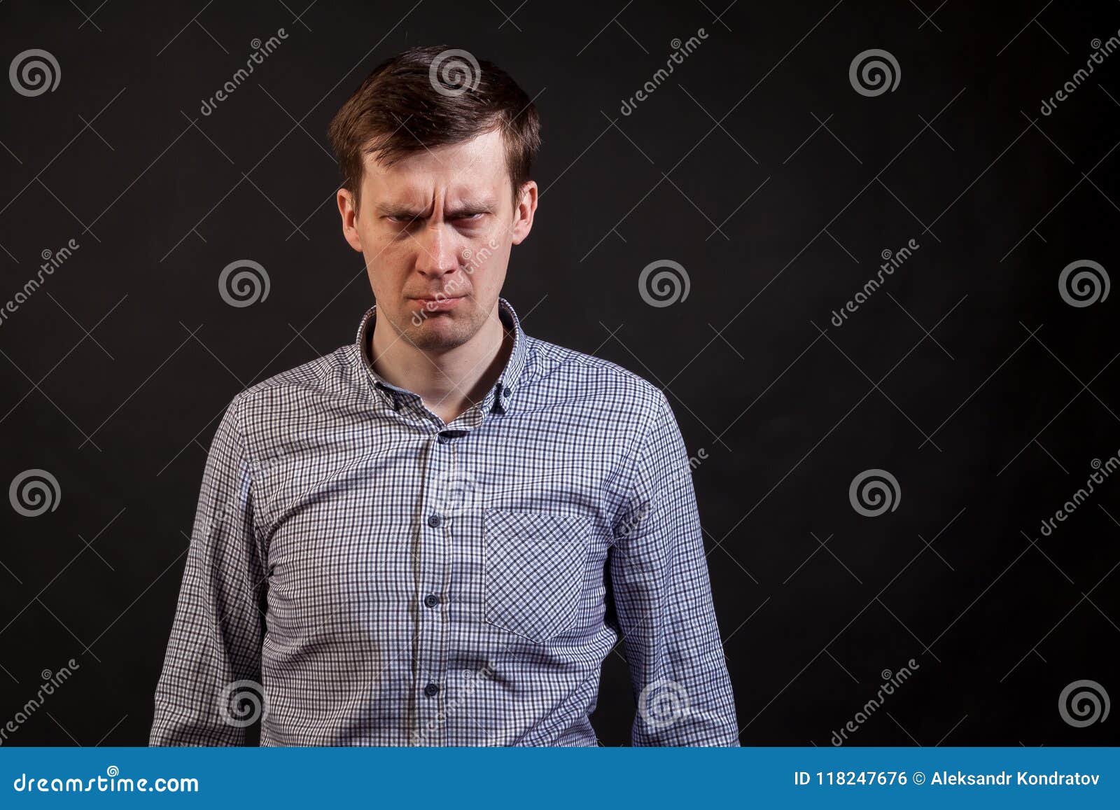 A Dark Haired White Man with a Distrust Expression Face Stock Photo ...