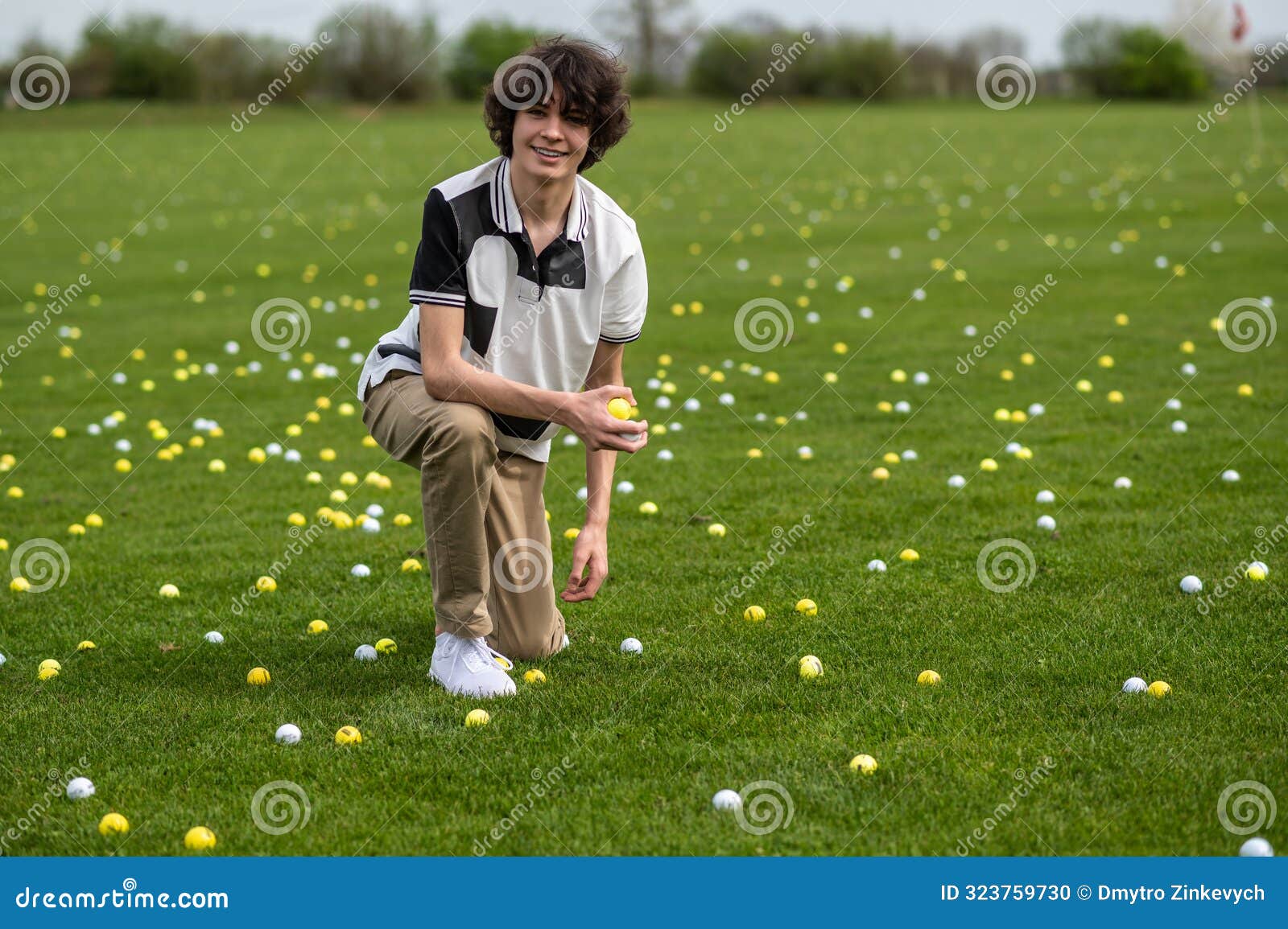 Dark-haired Young Guy Training in a Golf Club Stock Photo - Image of ...
