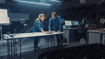 In the Dark Industrial Design Engineering Facility Male and Female ...