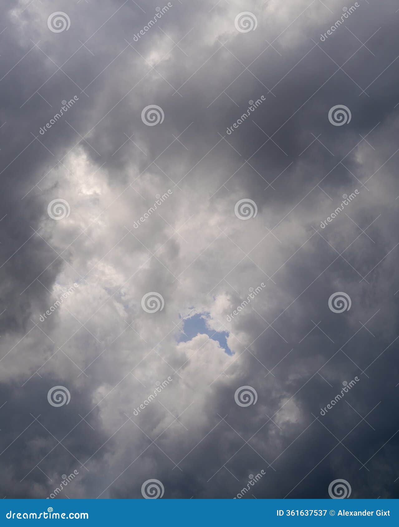 Heavy, Brooding Storm Clouds Gather in the Sky, Creating a Dramatic and ...