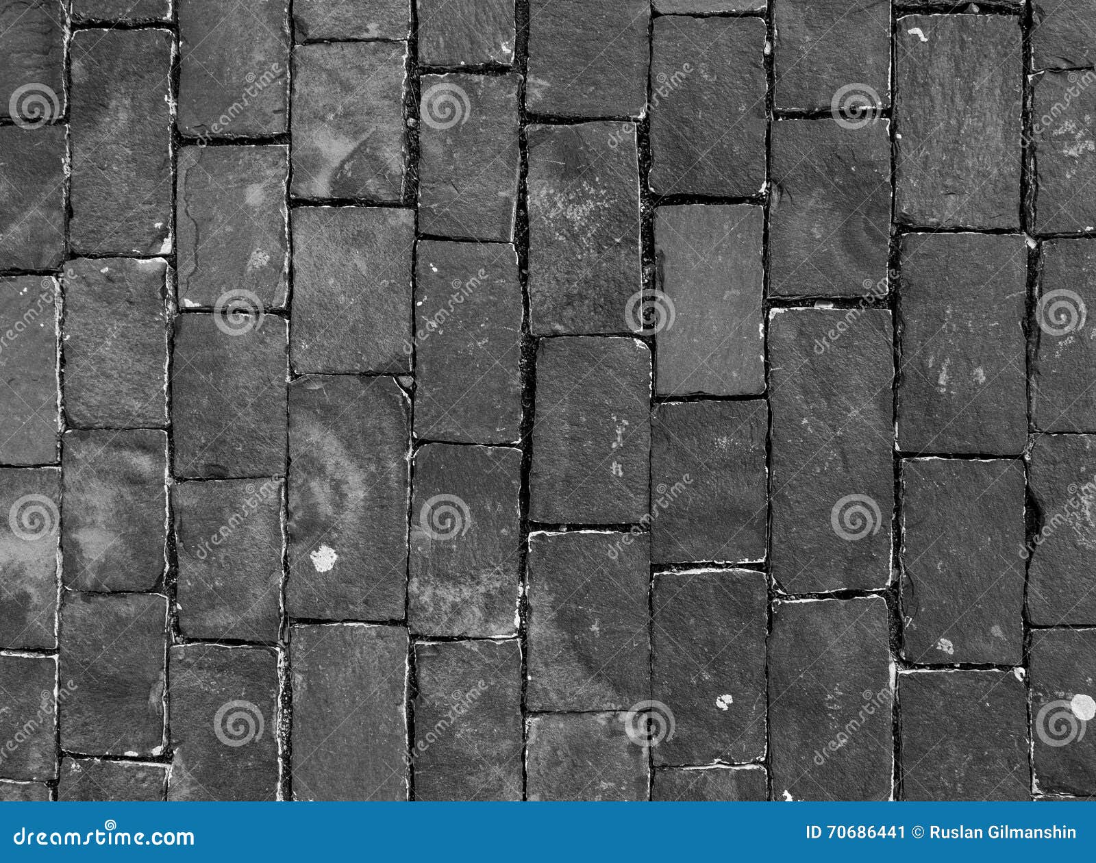 Dark paving stone roadway stock image. Image of road - 70686441