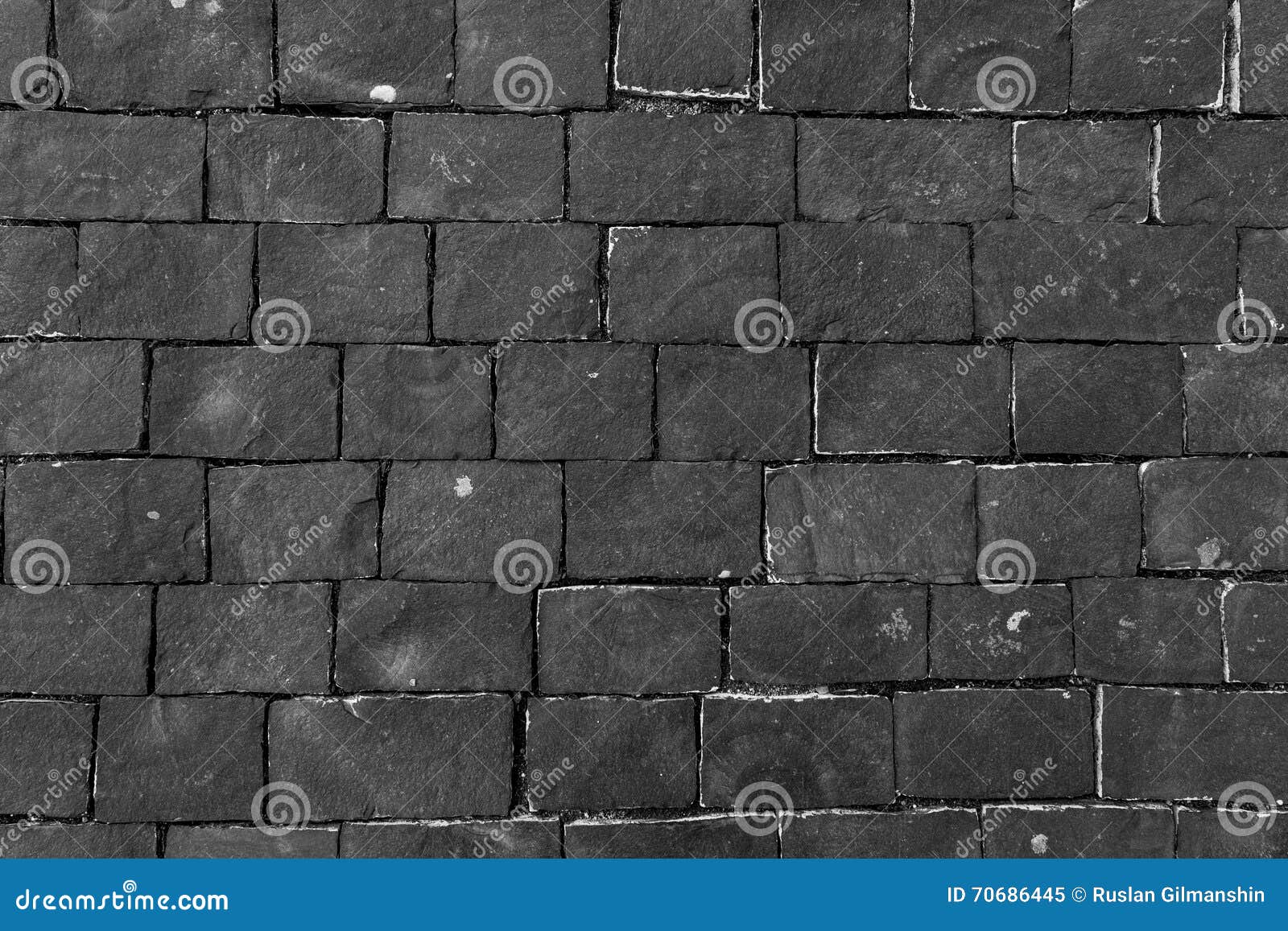Dark paving stone roadway stock image. Image of mosaic - 70686445