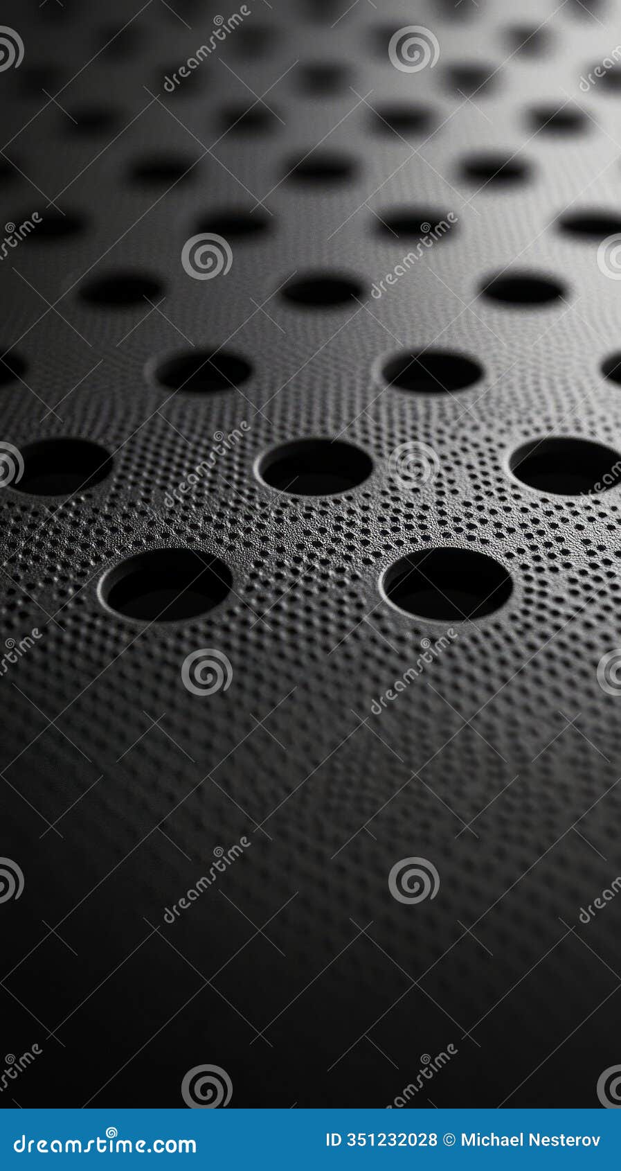 Dark Perforated Material Showing a Regular Pattern of Circular Holes ...