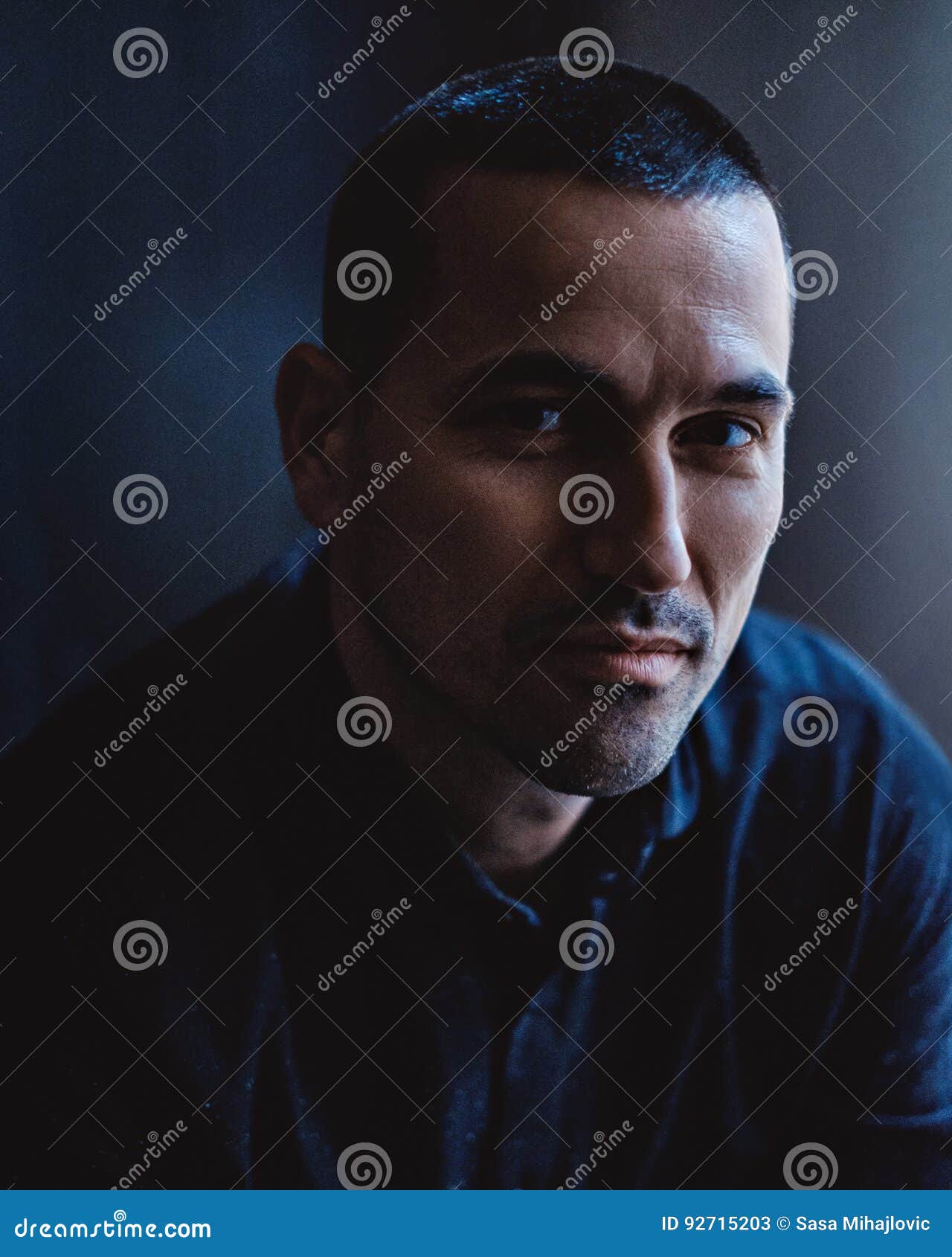 Dark Portrait of a Man Looking into the Camera Stock Image - Image of ...