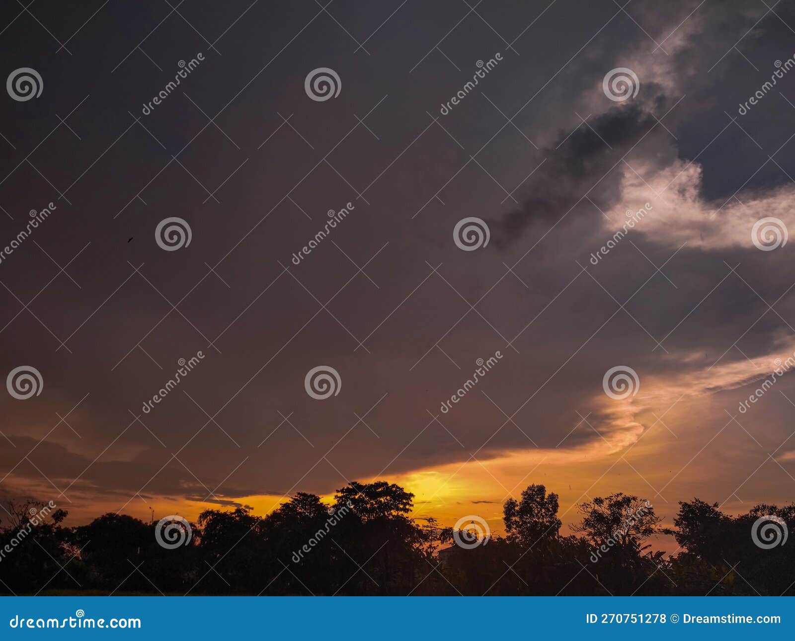 Clouds and Sunset Light Mixed in the Dark Windy Sky Stock Photo - Image ...
