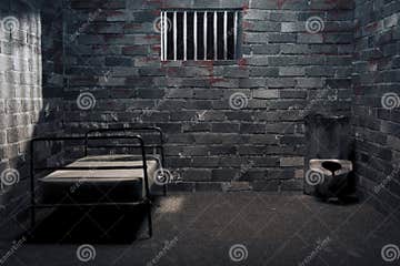 Dark prison cell at night stock photo. Image of brick - 16387446