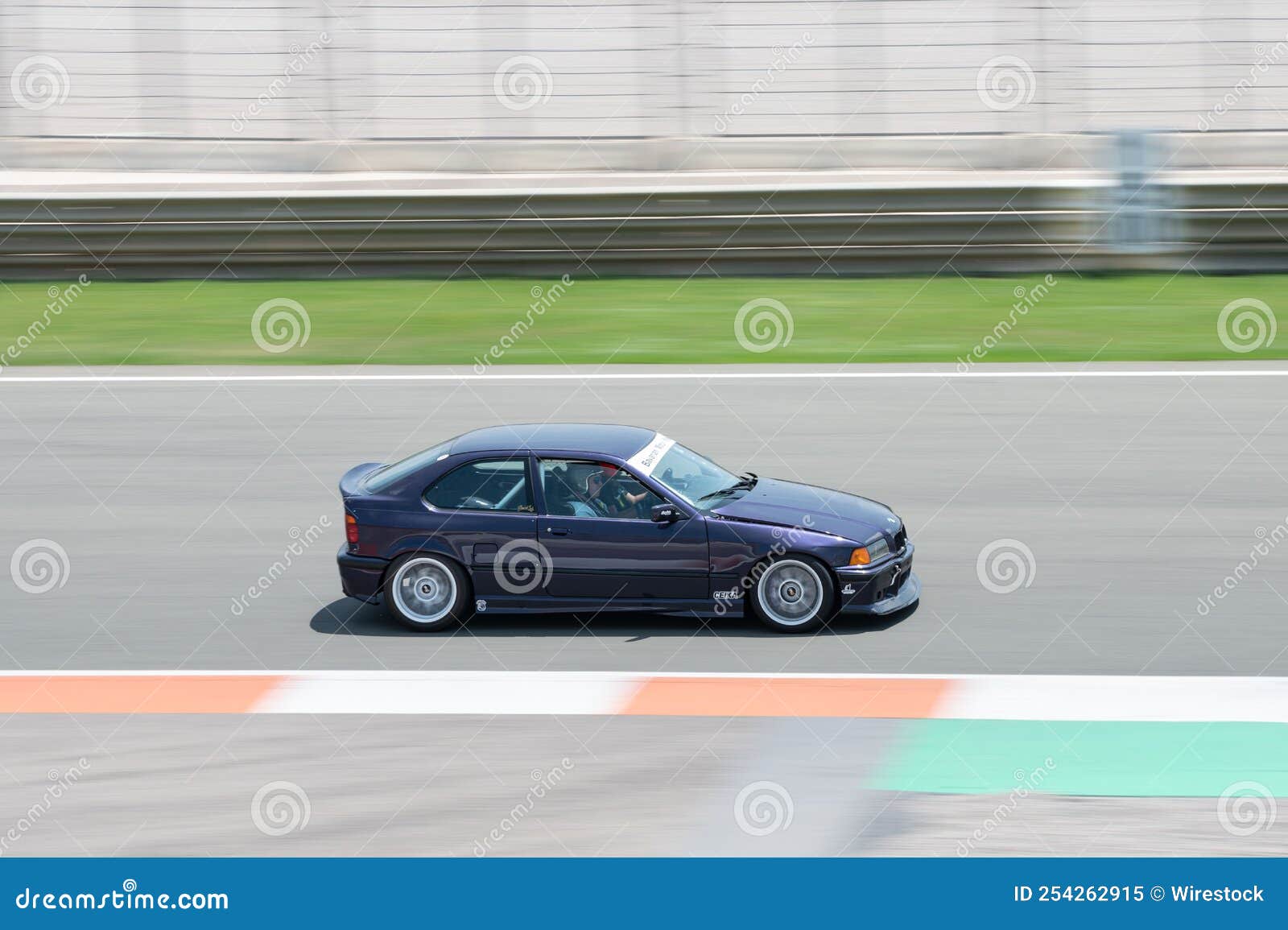 Dark Purple BMW E36 Racing Car Driving on a Track Editorial Image ...