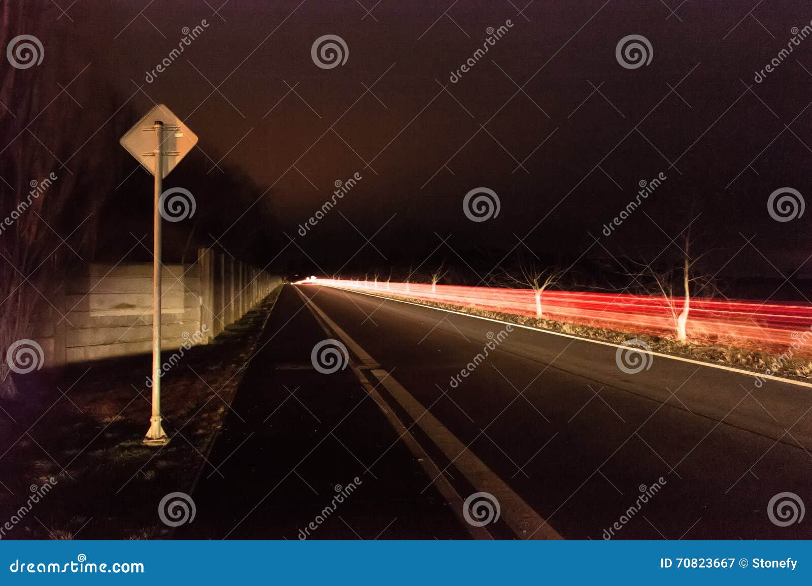 Dark road at night stock image. Image of arrow, blue - 70823667