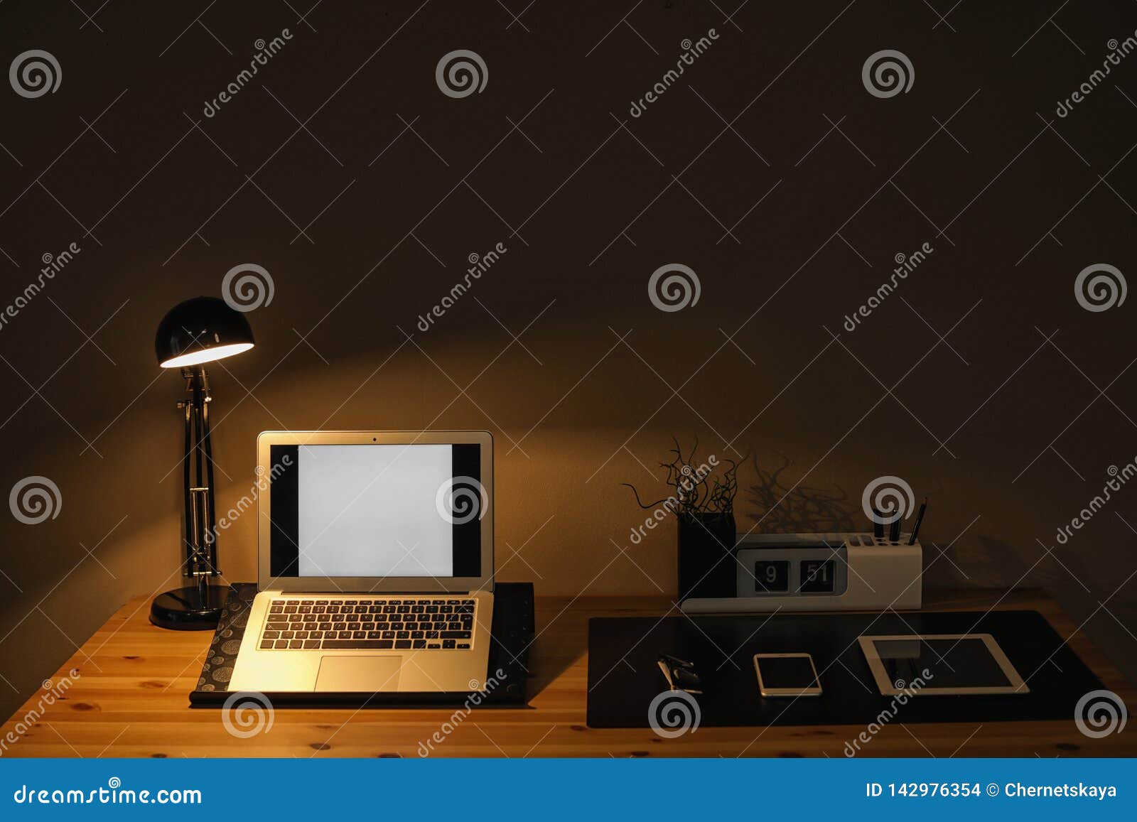 Dark Room Interior with Laptop and Devices on Table Stock Photo - Image ...