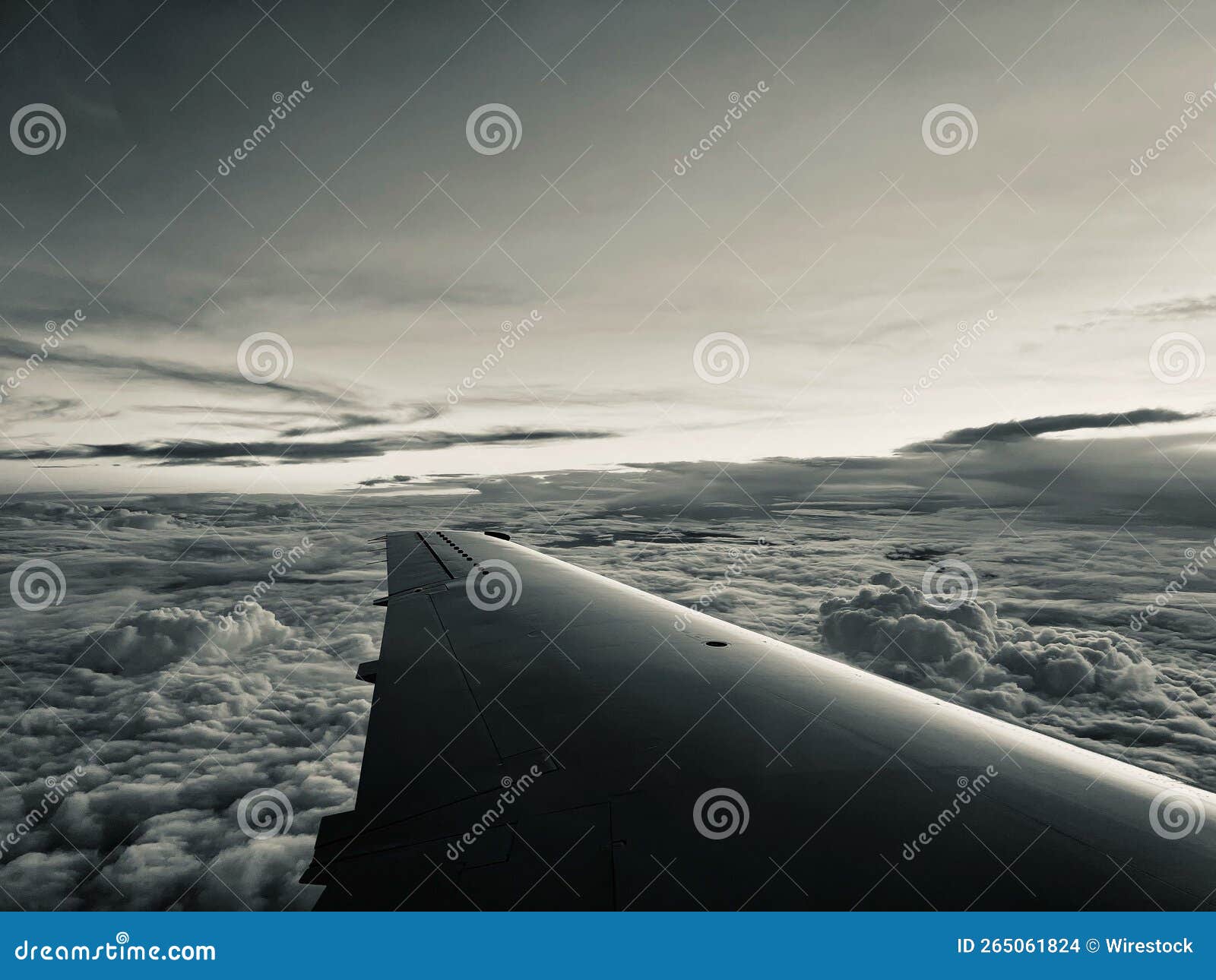 Dark Shot of the Wing of a Plane in the Clouds during Its Flight Stock ...