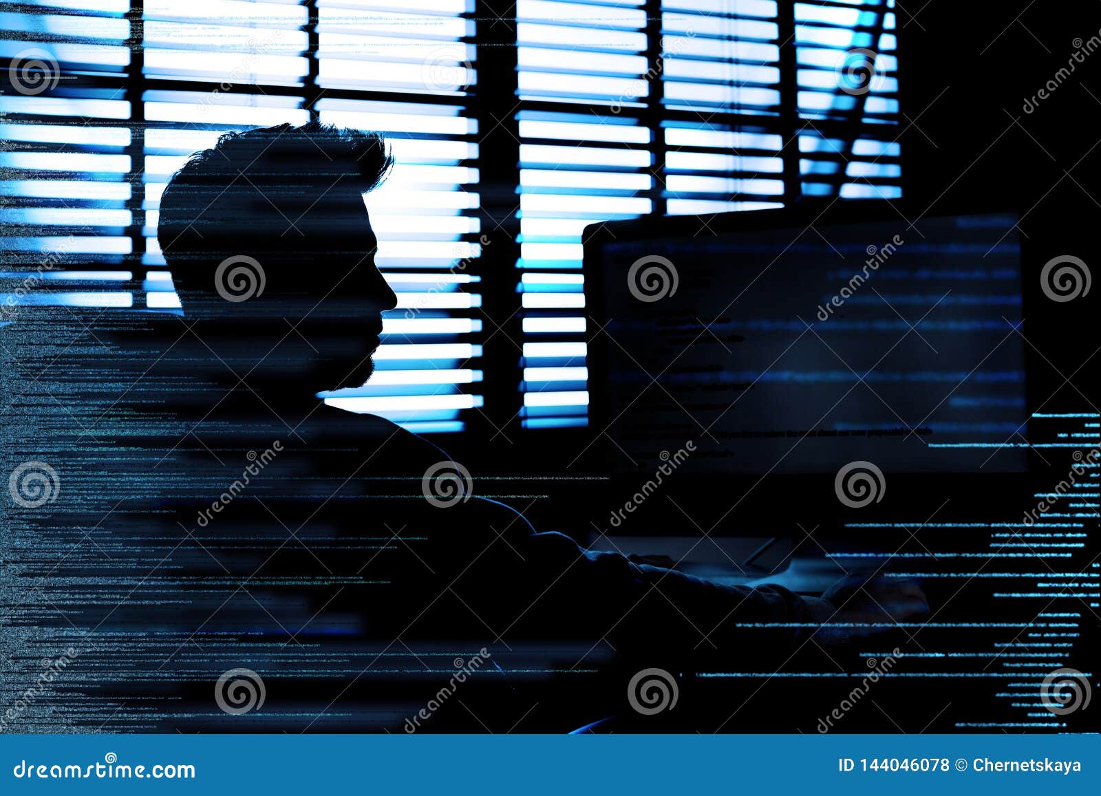 Silhouette of Cyber Criminal Hacking Computer Behind Digital Symbols ...