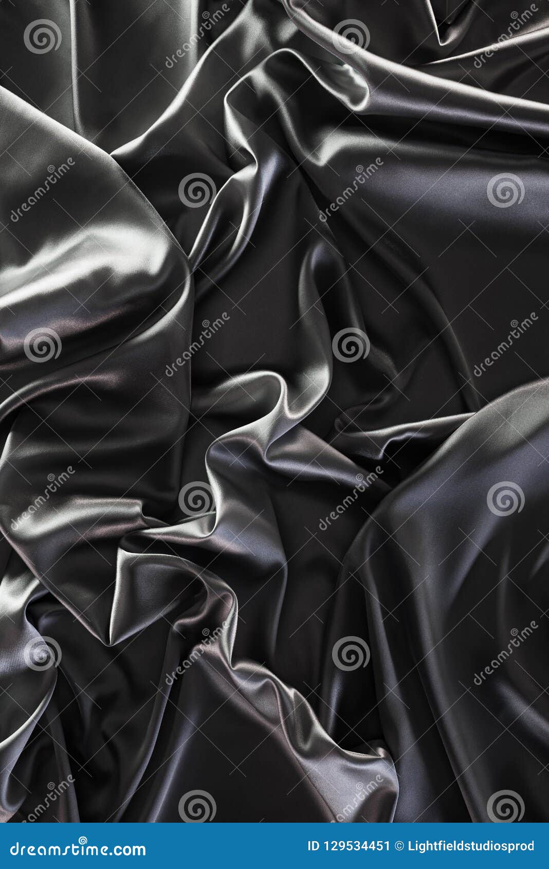 Dark silver crumpled silk stock image. Image of luxury - 129534451