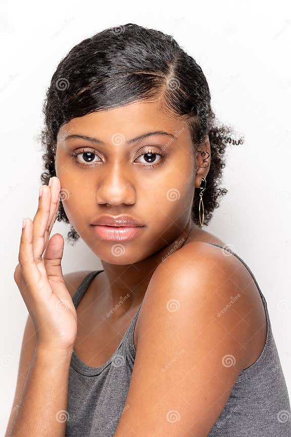 Dark Skinned Girl With Afro Hair Puts Dermatological Cream On Her Hand