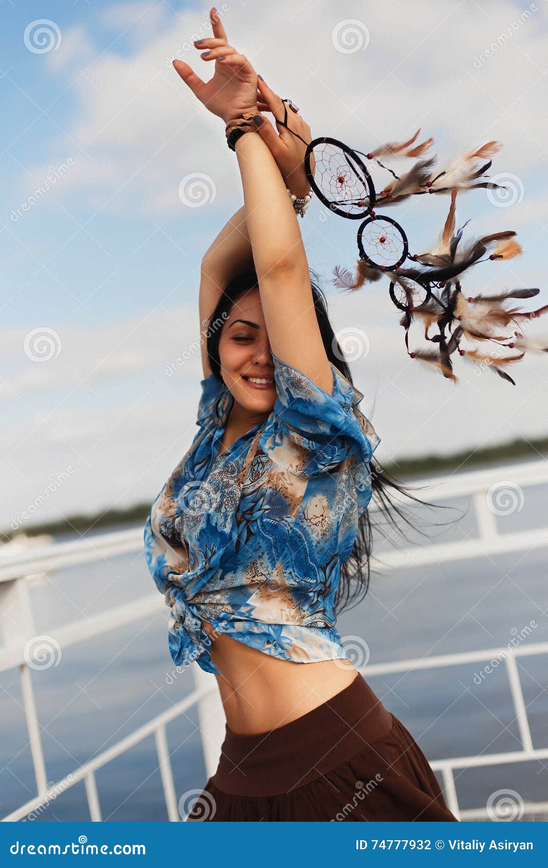 Dark-skinned Girl with a Dream Catcher on the Shore Stock Photo - Image ...