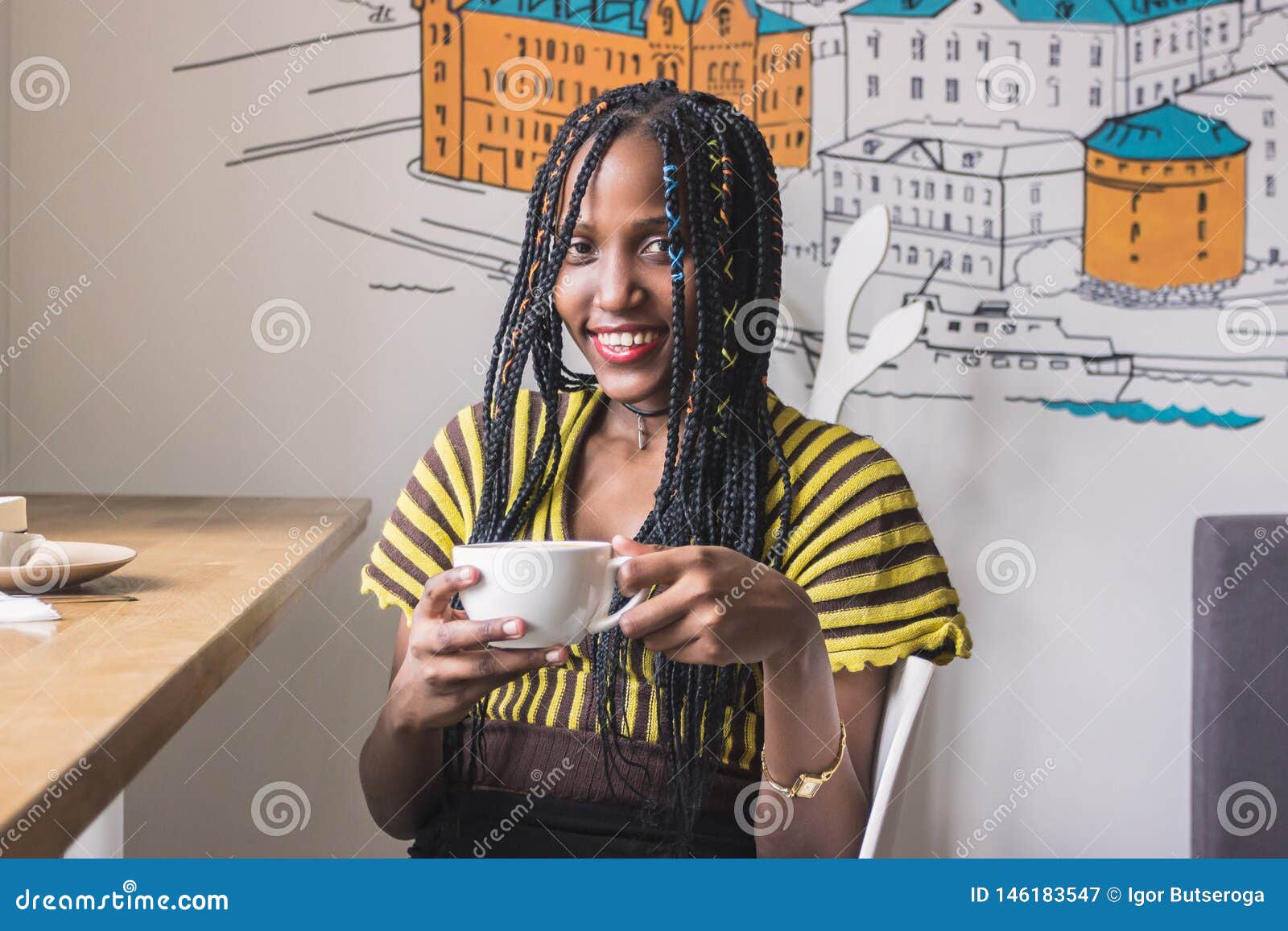 Dark Skinned Woman Dressed In Casual Clothes Holding Cup Of Hot Drink