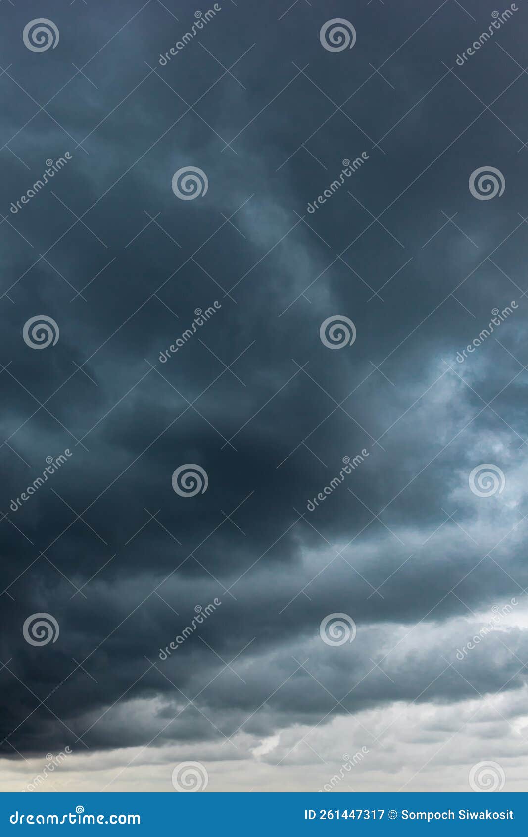 The Dark Sky with Heavy Clouds Converging and a Violent Storm before ...