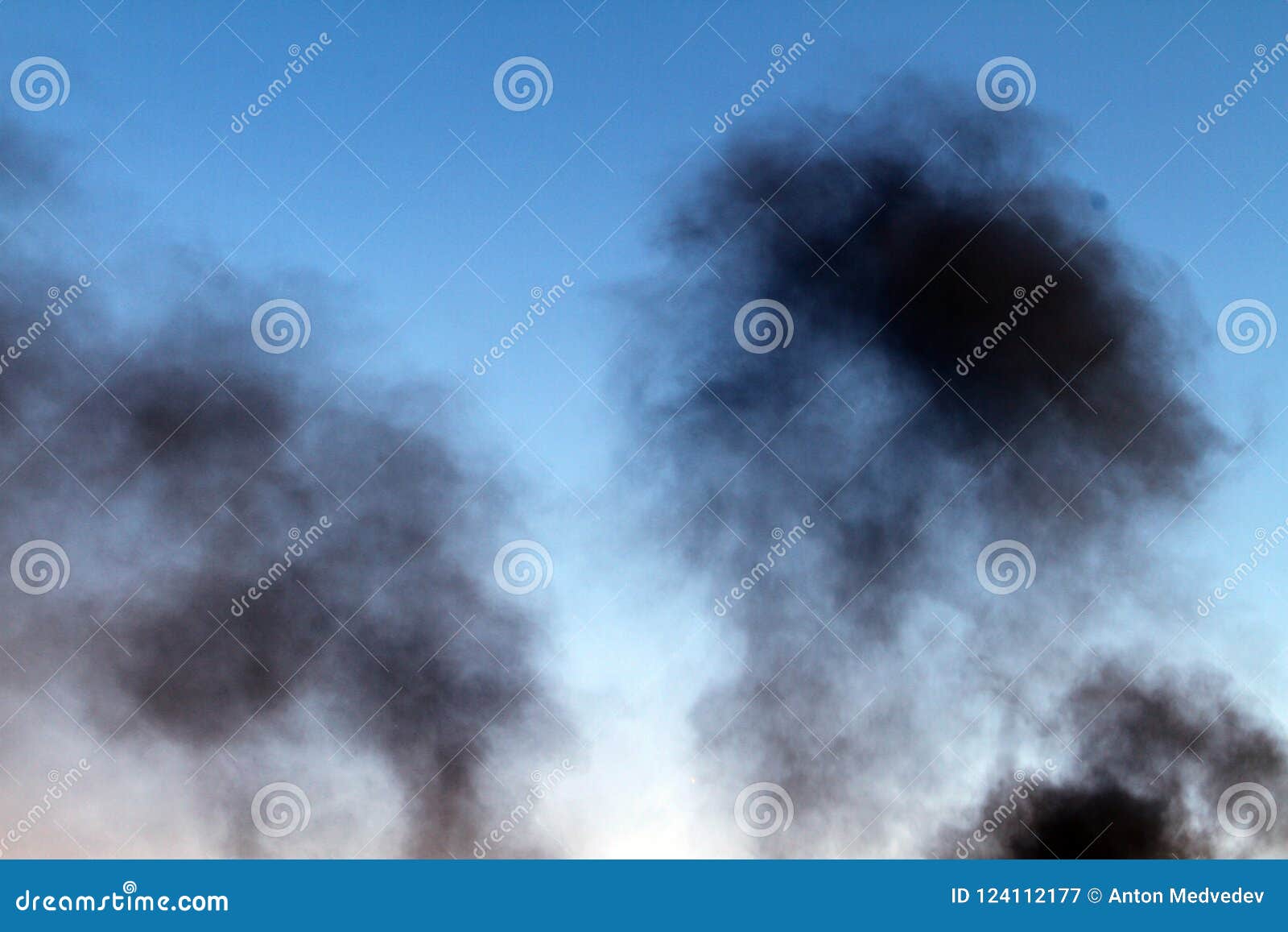 Dark Smoke Pillar on the Blue Sky Background. Stock Image - Image of ...