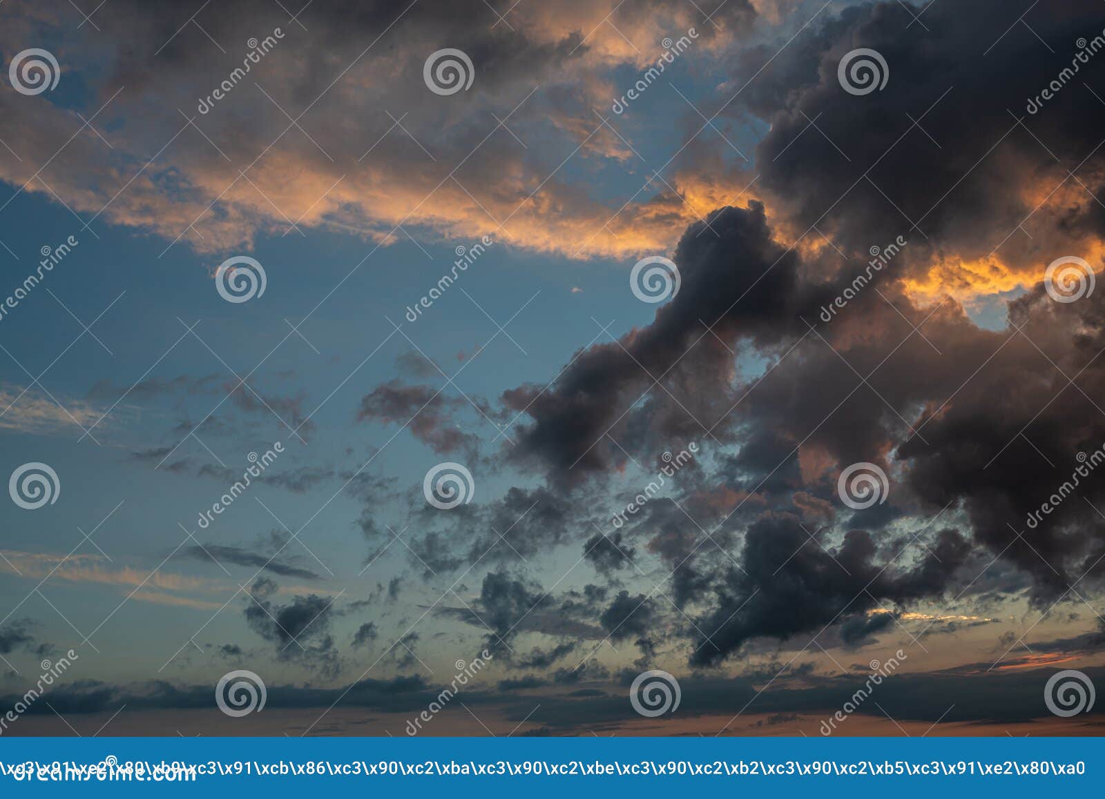 A Dark Thundercloud on the Background of Sunset Stock Photo - Image of ...