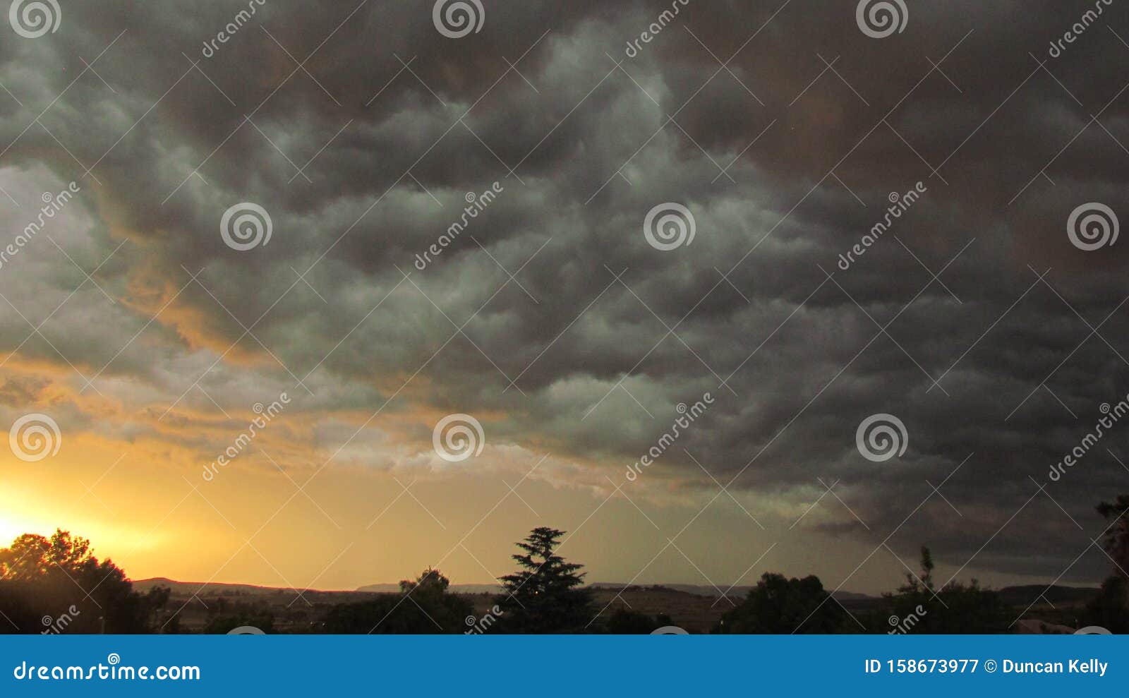 Dark Thunderclouds Underlit by Set Sun Stock Image - Image of painted ...