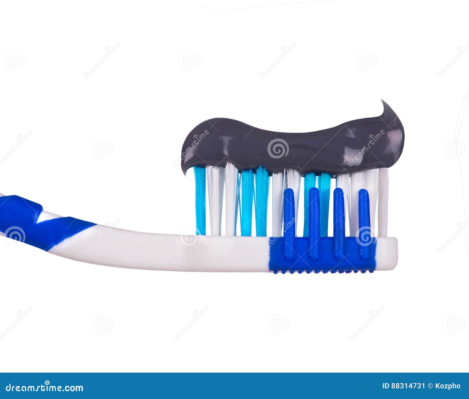 Dark Toothpaste on a Toothbrush Close-up on White Stock Image - Image ...