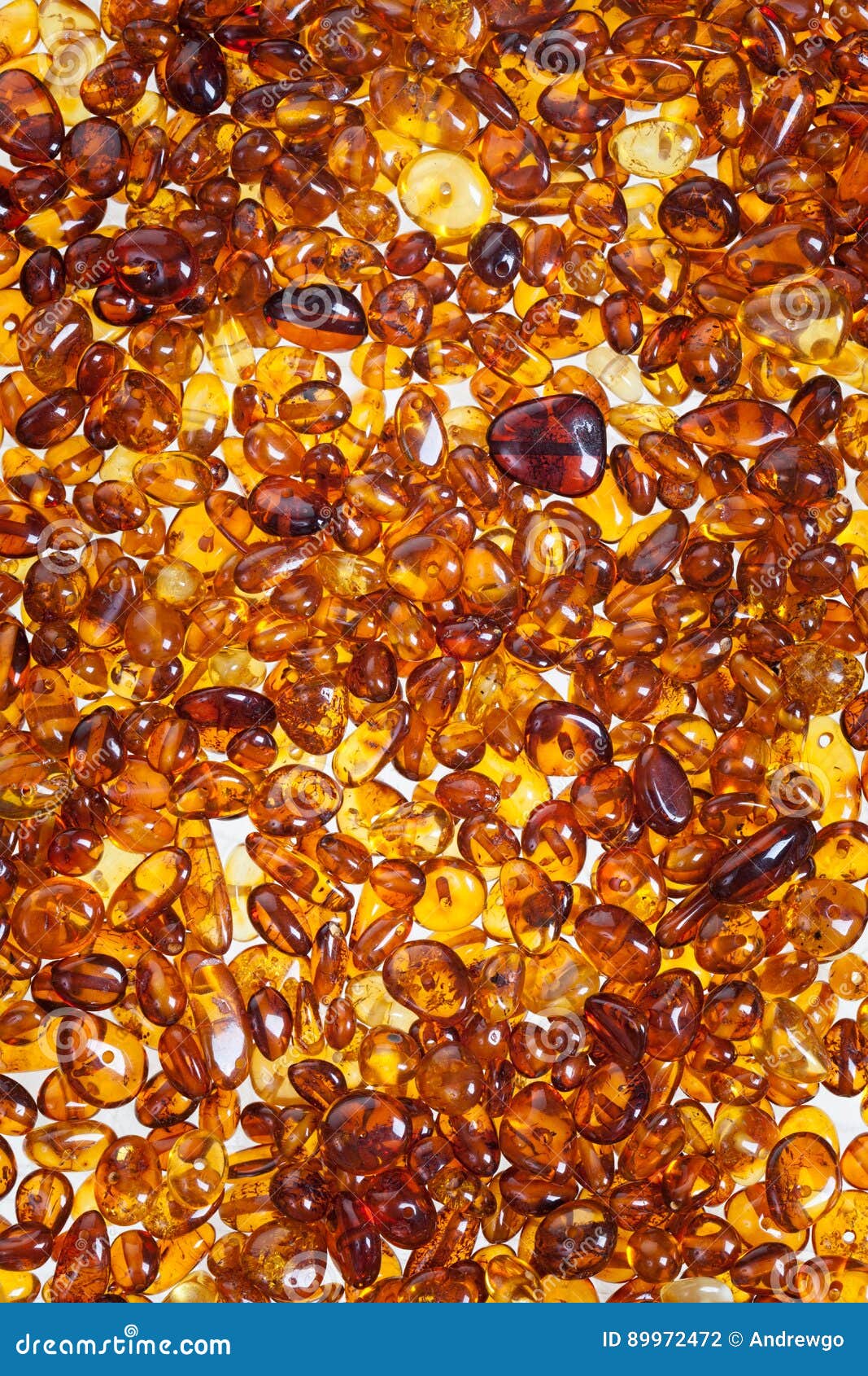 Dark yellow amber stones . stock photo. Image of decoration - 89972472