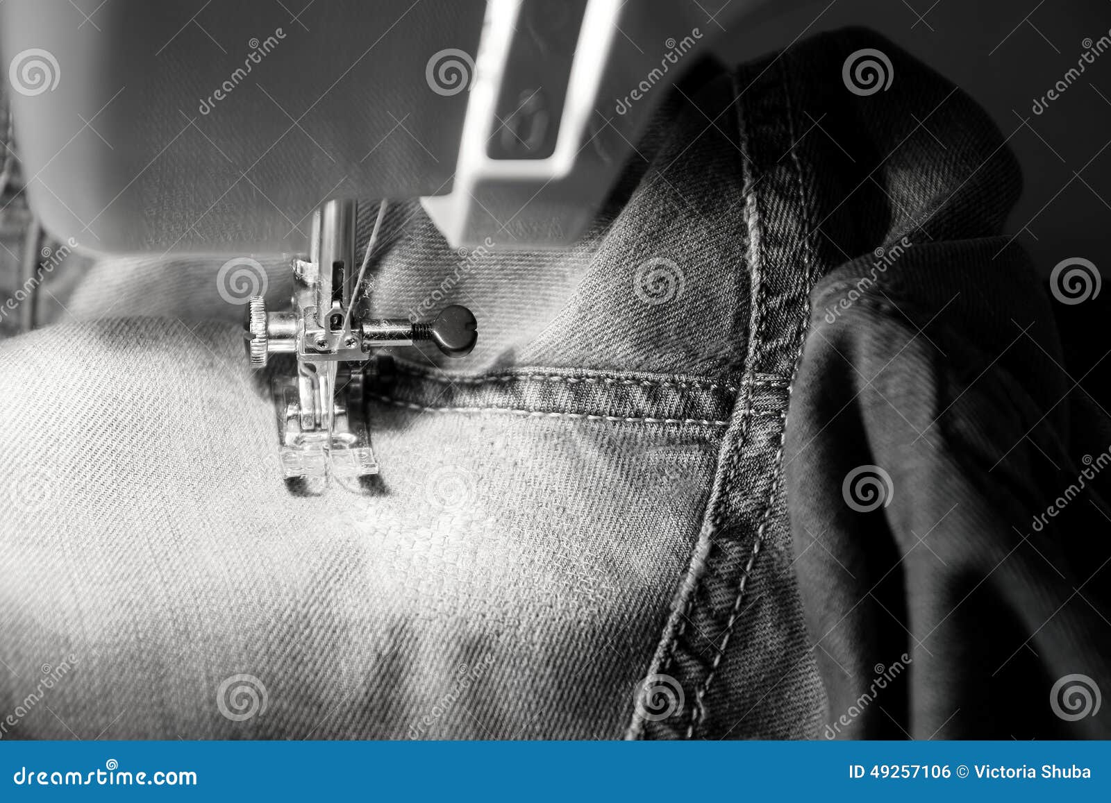 Darn jeans on the machine stock photo. Image of darning - 49257106