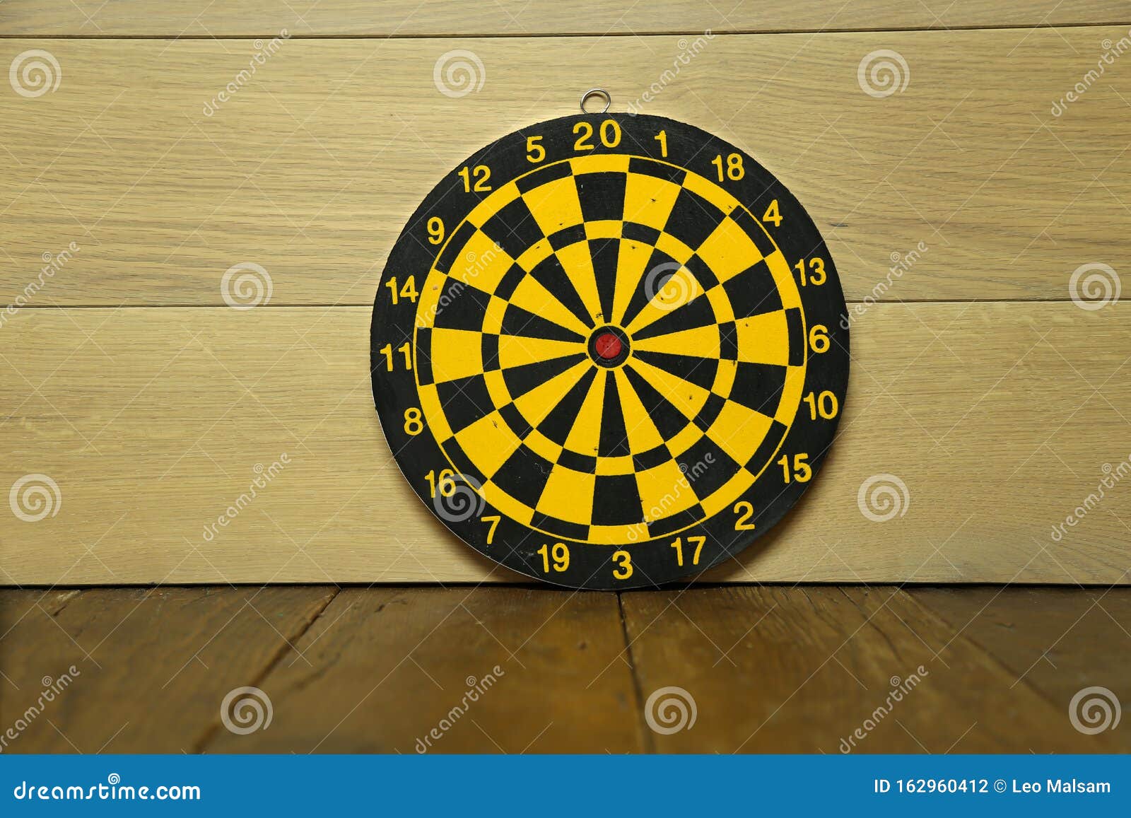 A Dart Board is Standing on the Table Stock Photo - Image of line ...