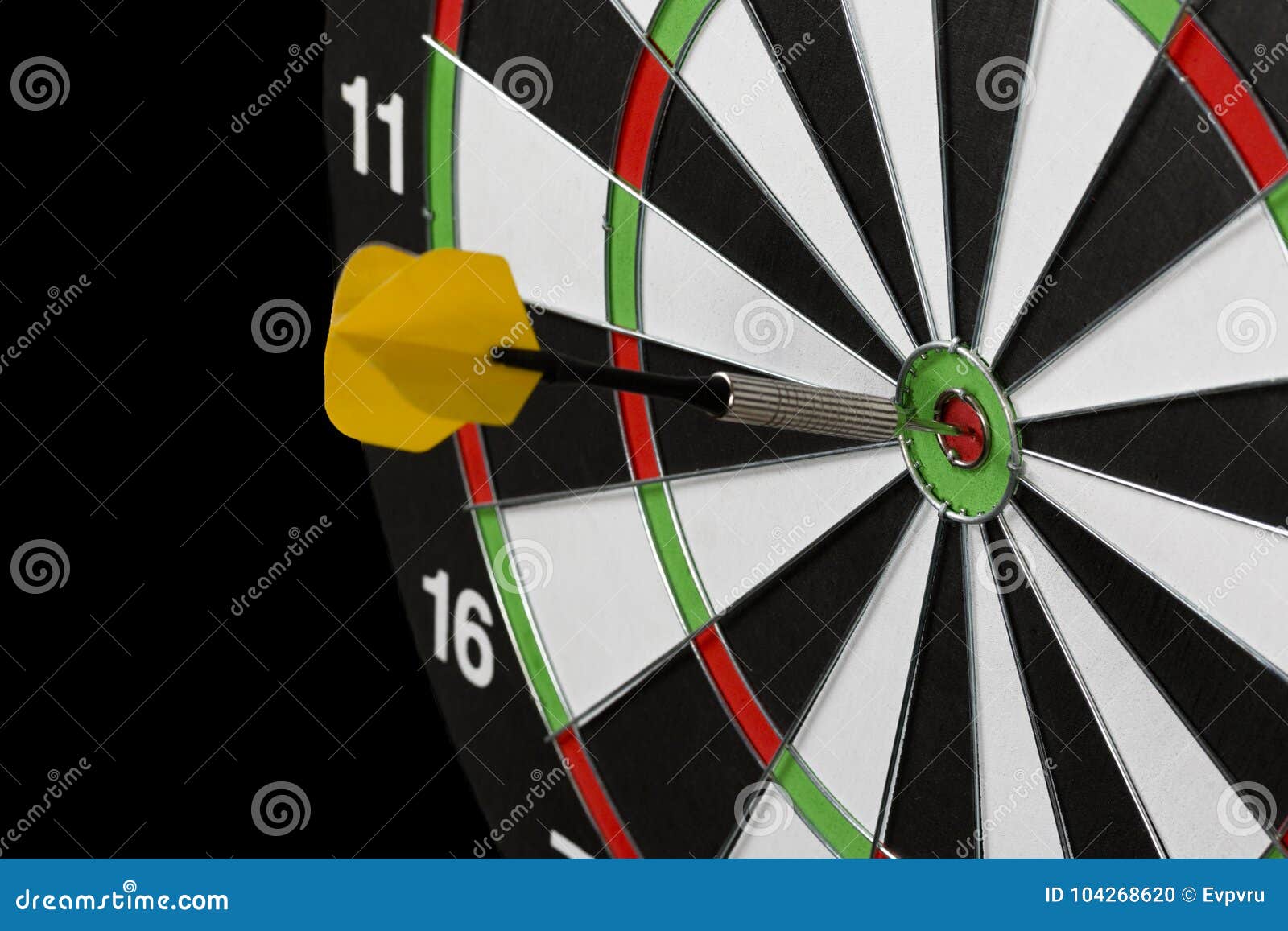 Dart stuck in a dartboard stock photo. Image of center - 104268620