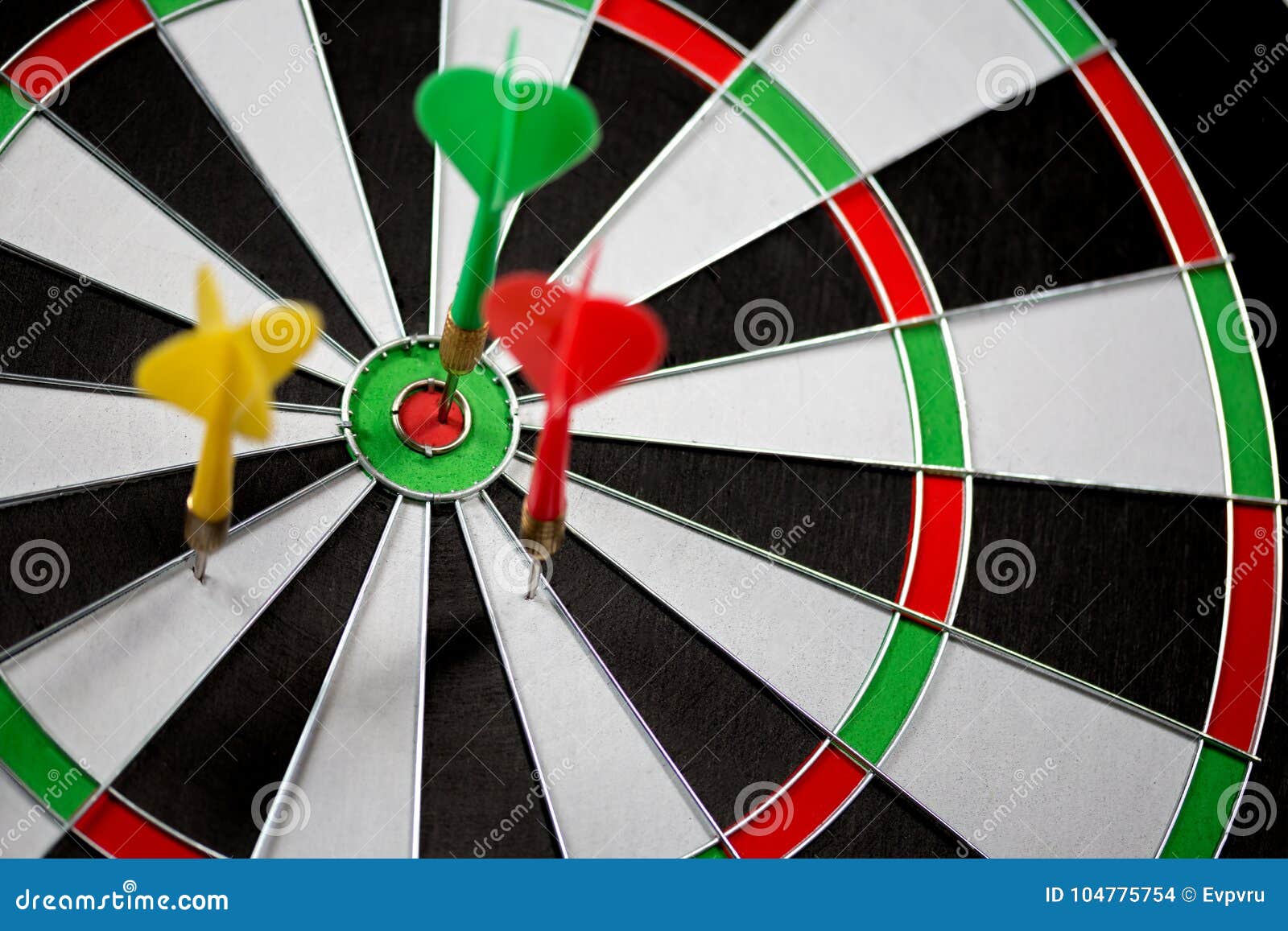 Dart stuck in a dartboard stock photo. Image of isolated - 104775754