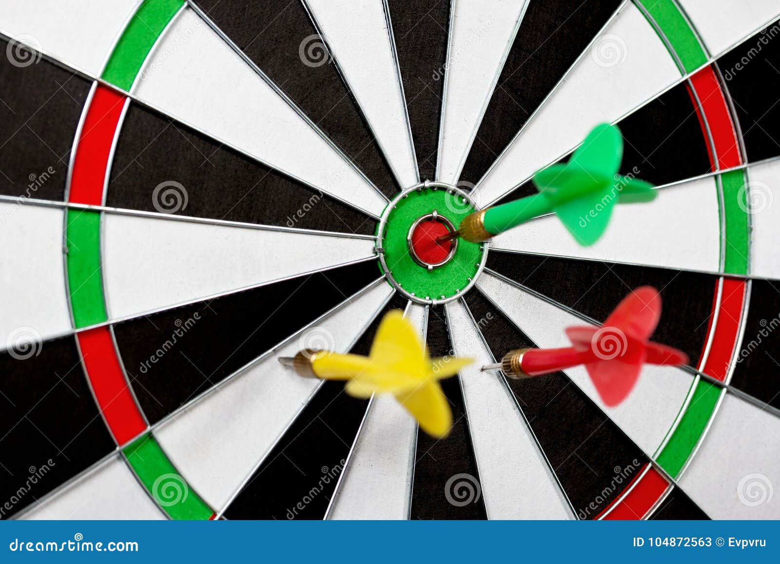 Dart stuck in a dartboard stock image. Image of arrow - 104872563