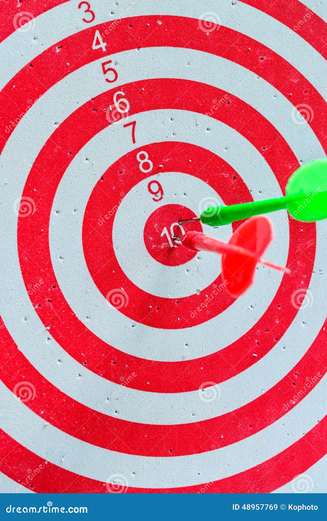 Darts hitting a target stock image. Image of background - 48957769
