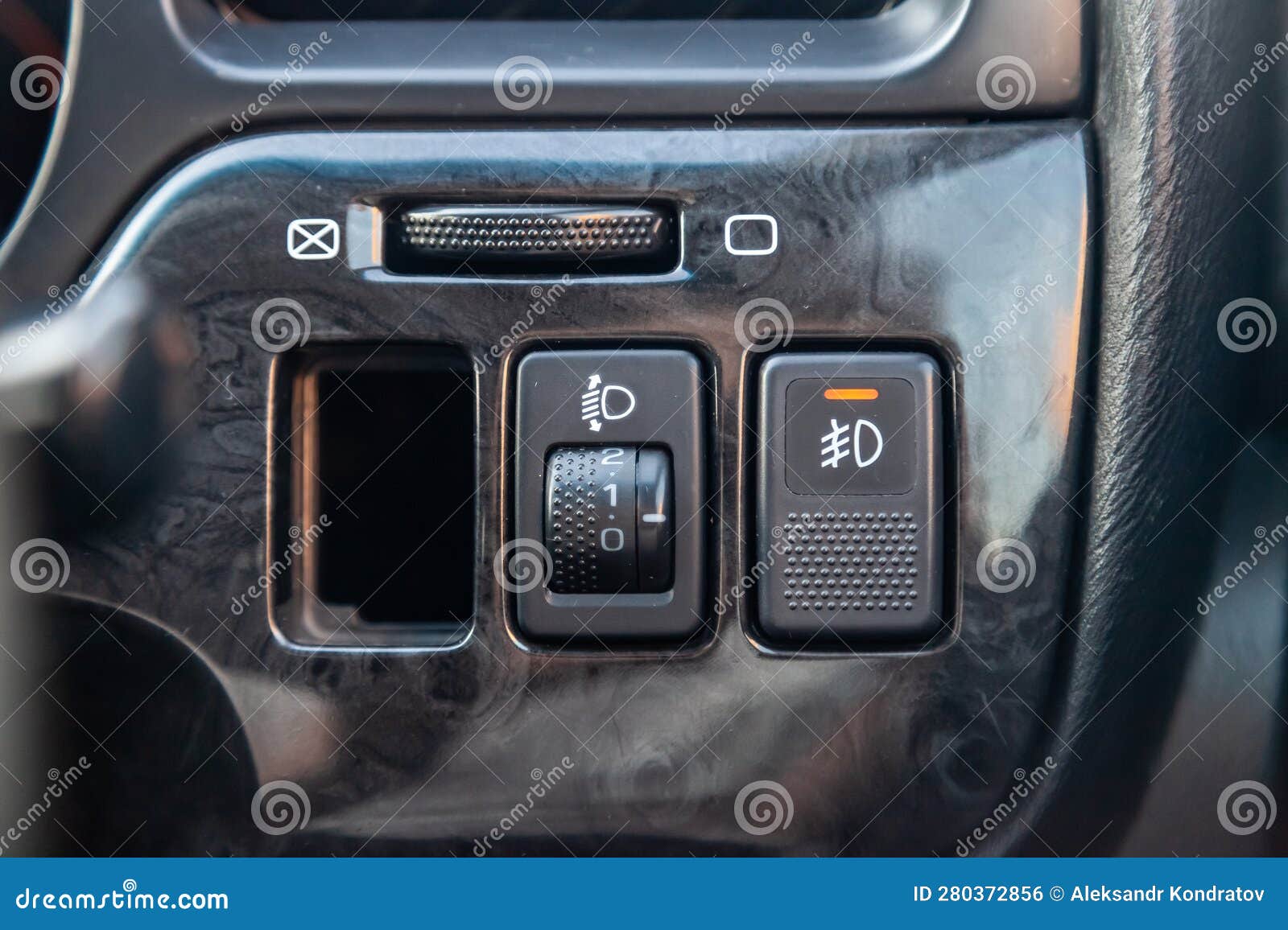 The Dashboard of the Car S Interior is Black with a Dipped Headlamp ...