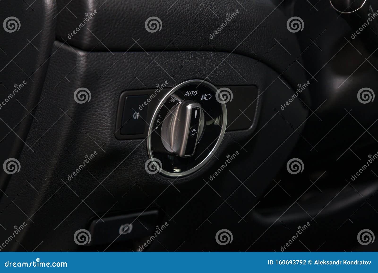 The Dashboard of the Car`s Interior is Black with a Dipped Headlamp ...